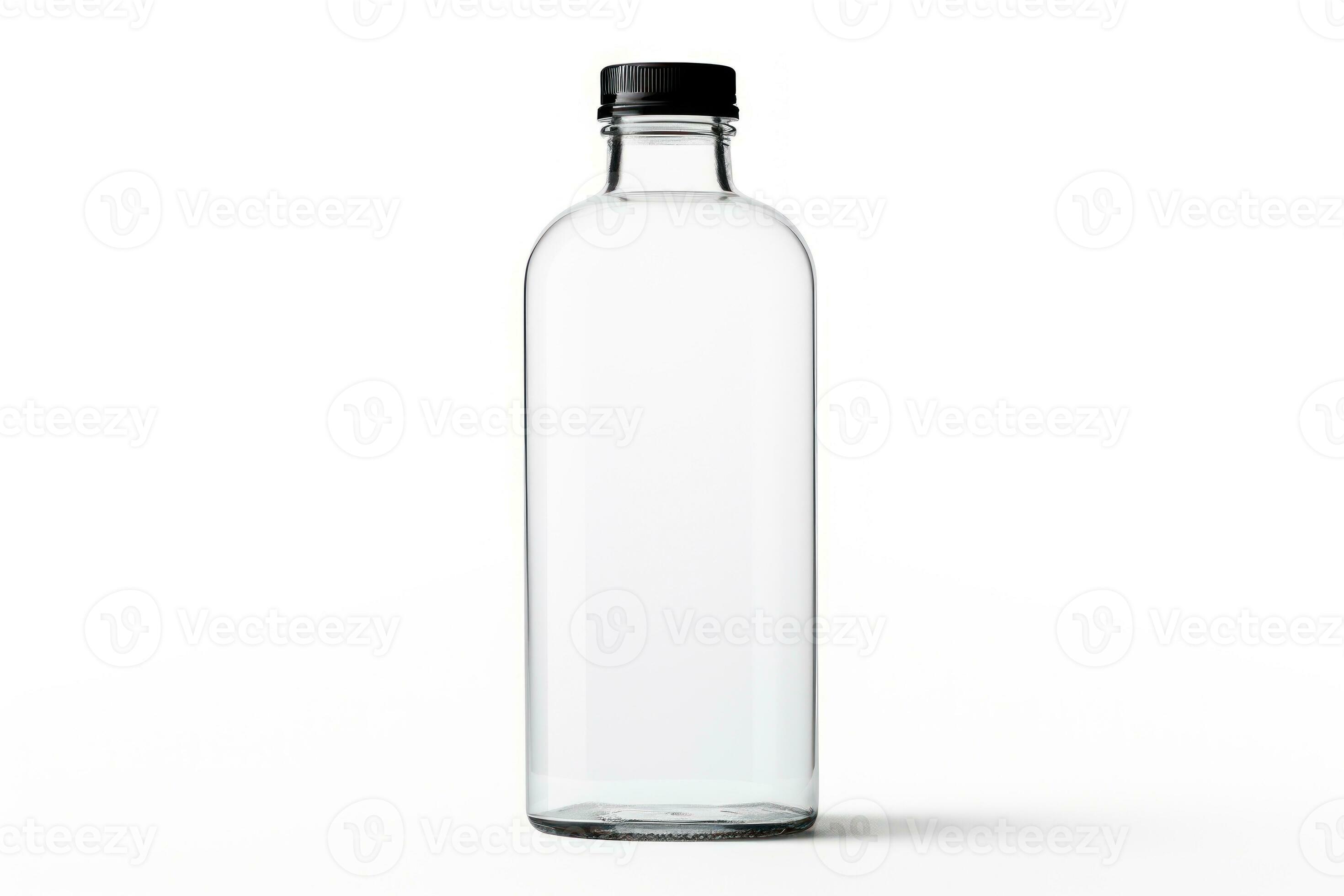 Transparent clean empty Glass bottle with cap isolated on white background. Mockup, template for ...