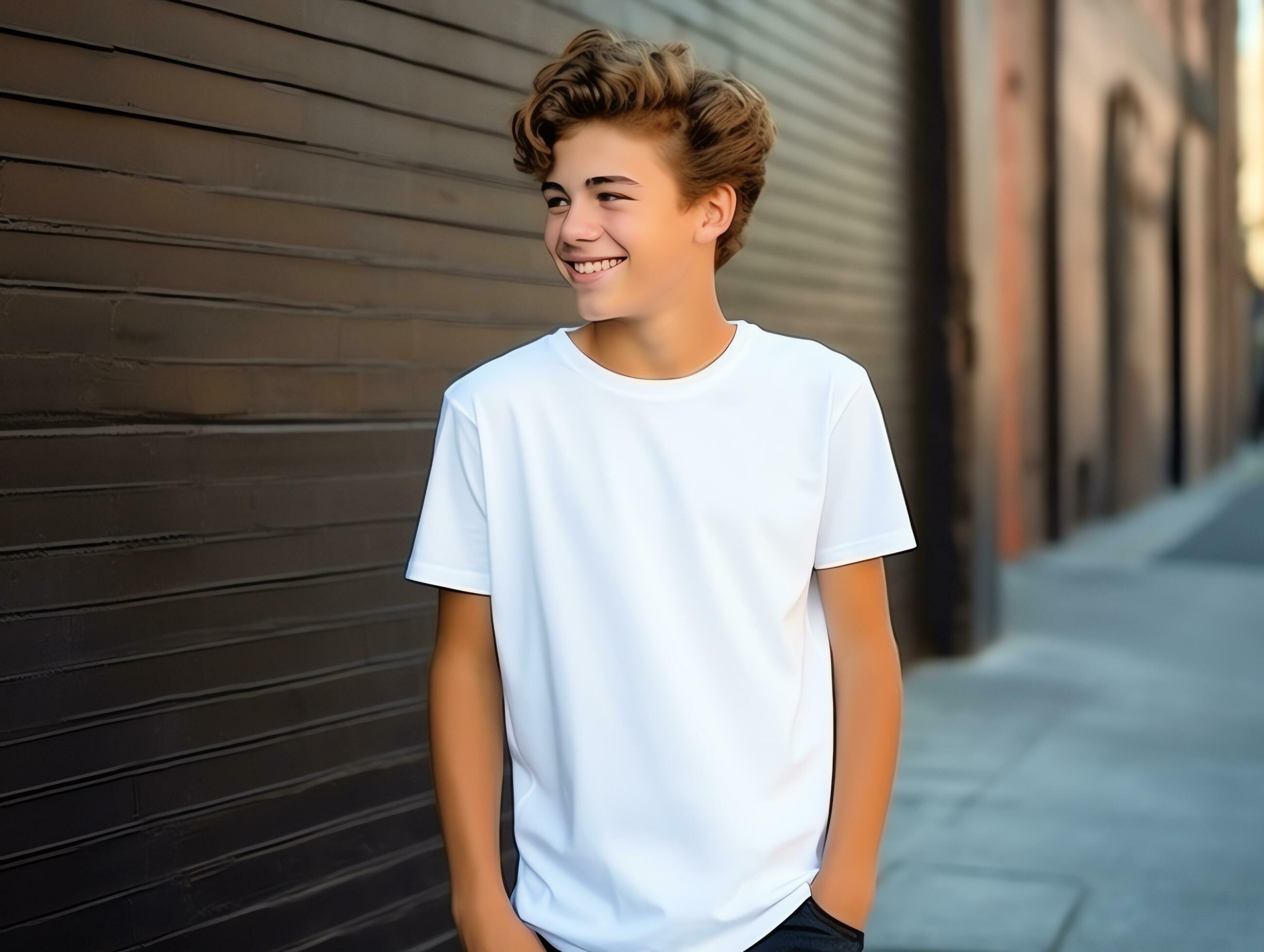 Cute teen boy wearing blank empty white t-shirt mockup for design ...