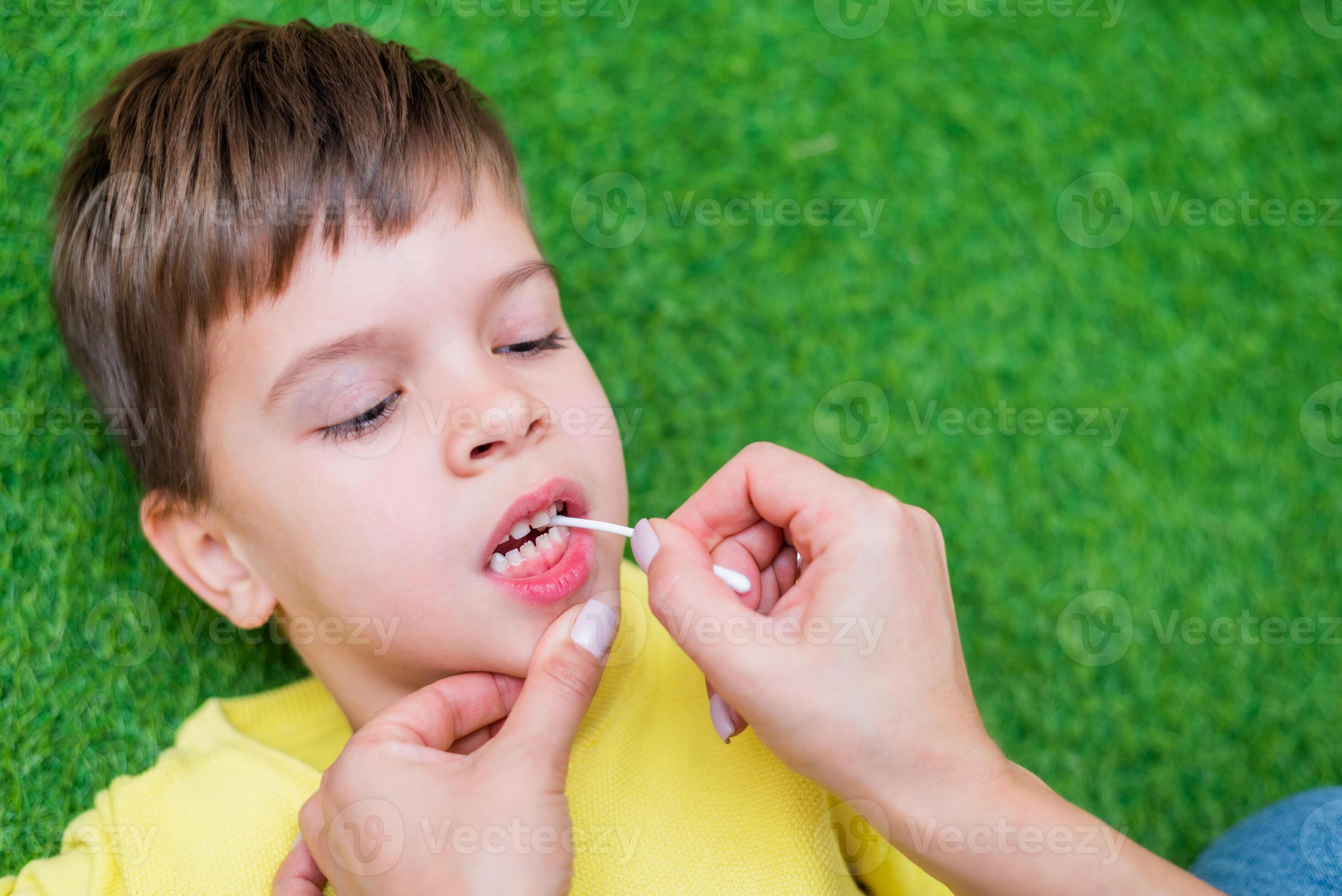 A little boy is engaged in a speech therapist's office and corrects his ... A little boy is engaged in a speech therapist's office and corrects his ...