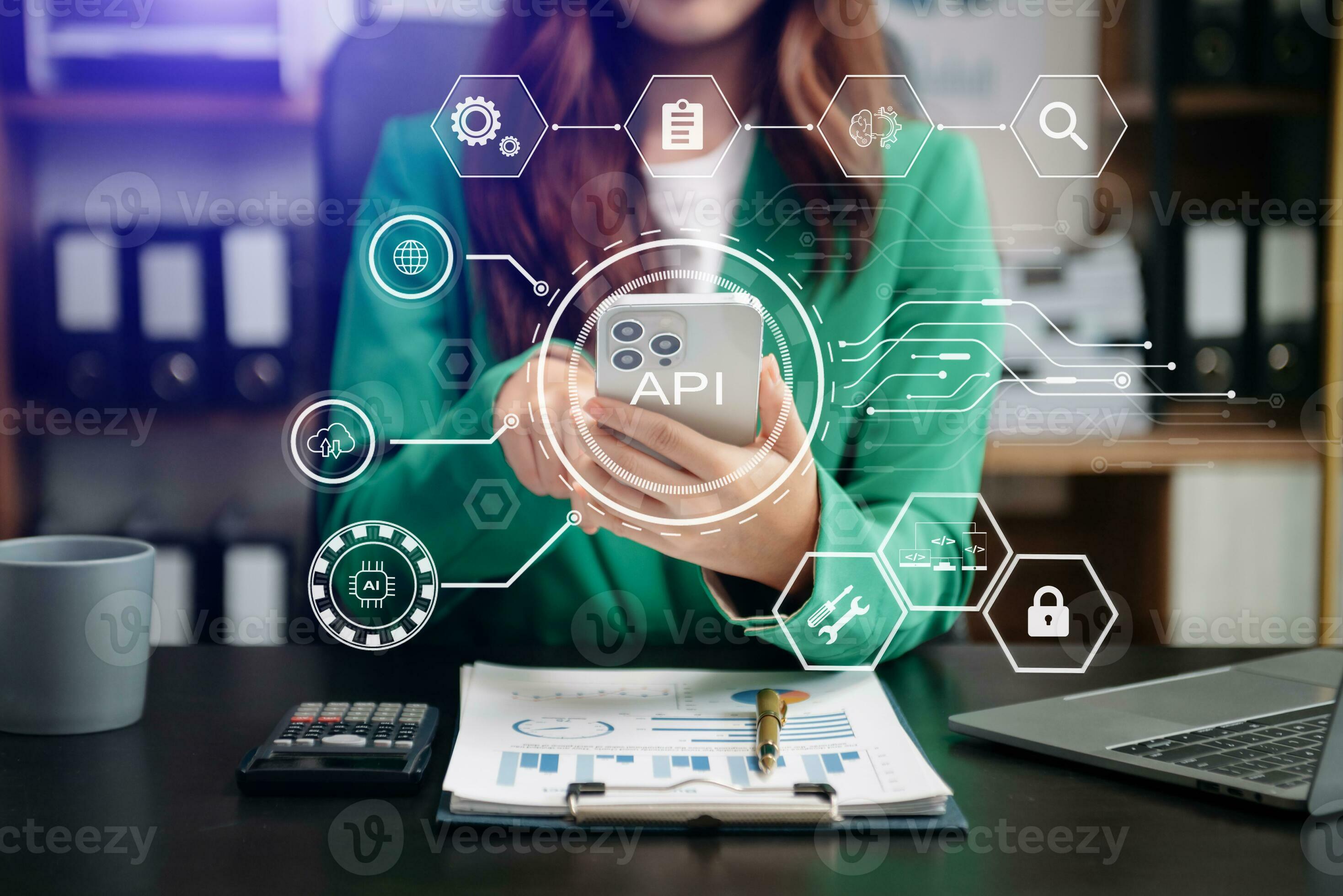 API Application Programming Interface, woman using laptop, tablet and smartphone with virtual ...