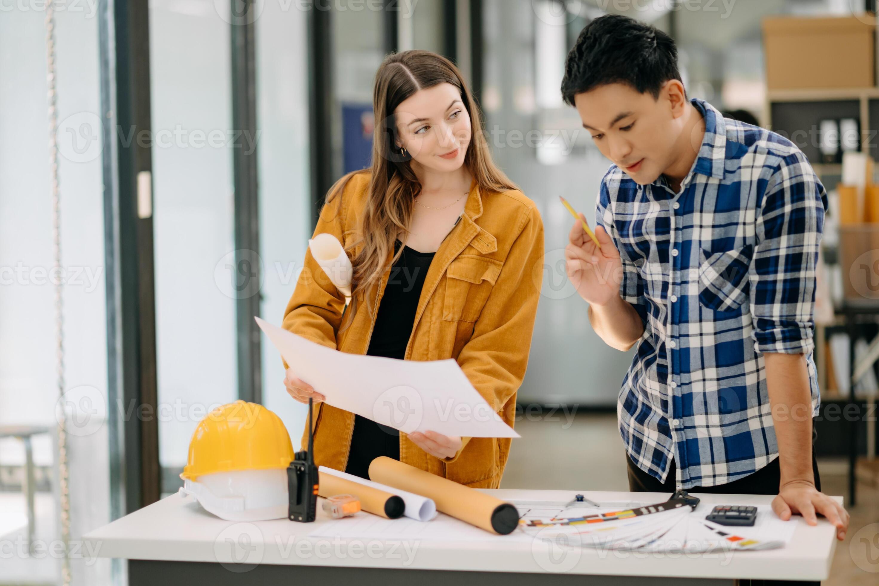 Engineer teams meeting working together wear worker helmets hardhat with on architectural ...