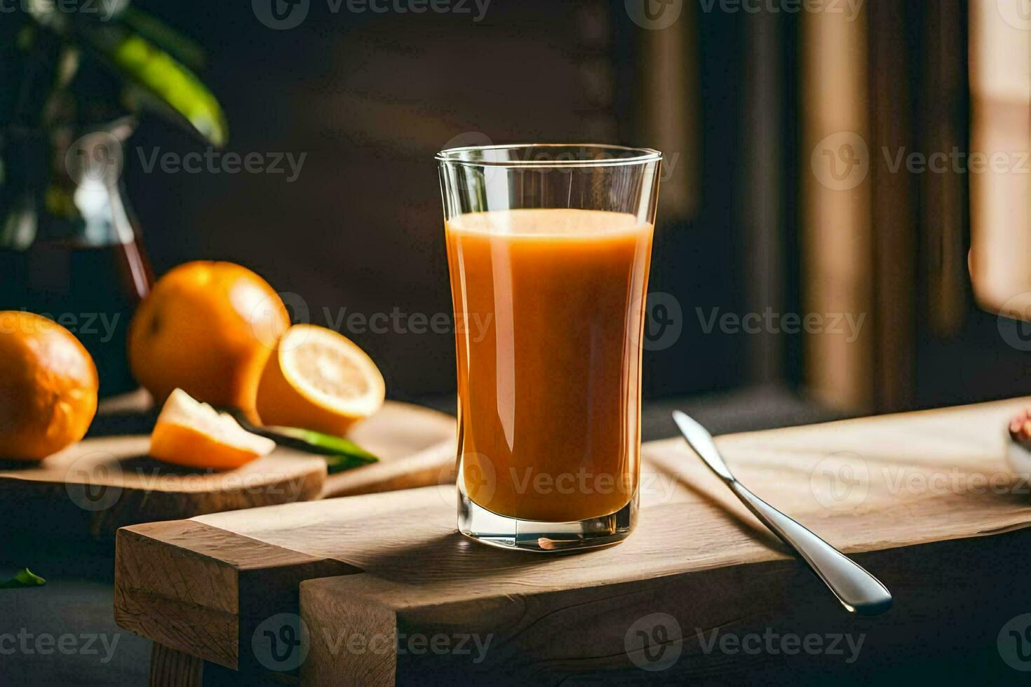 an orange juice glass sits on a table next to a knife and spoon. AI-Generated 33620266 Stock ...