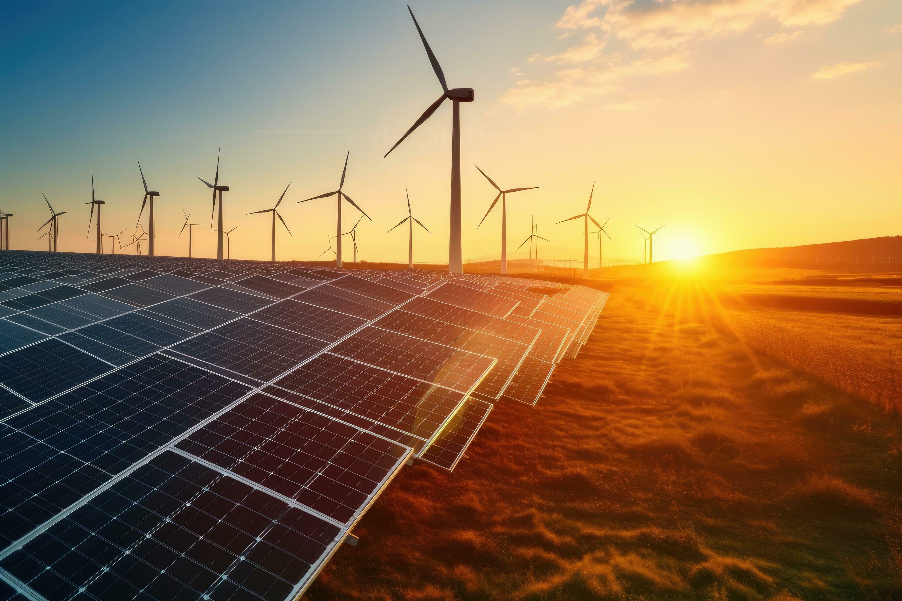 solar energy panels and wind turbines at sunset, alternative ...