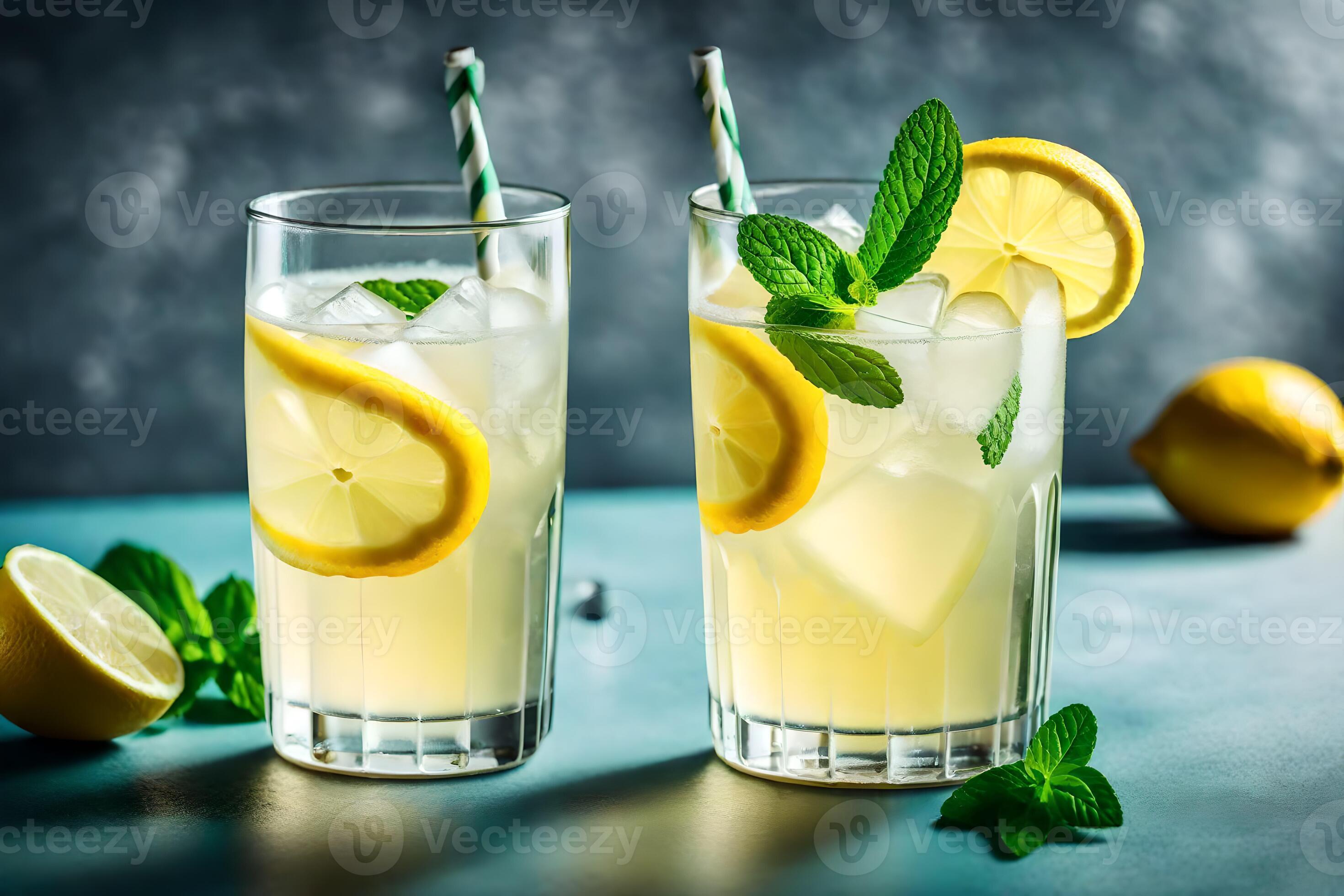 two glasses of lemonade with mint leaves and lemons. AI-Generated 33810589 Stock Photo at Vecteezy