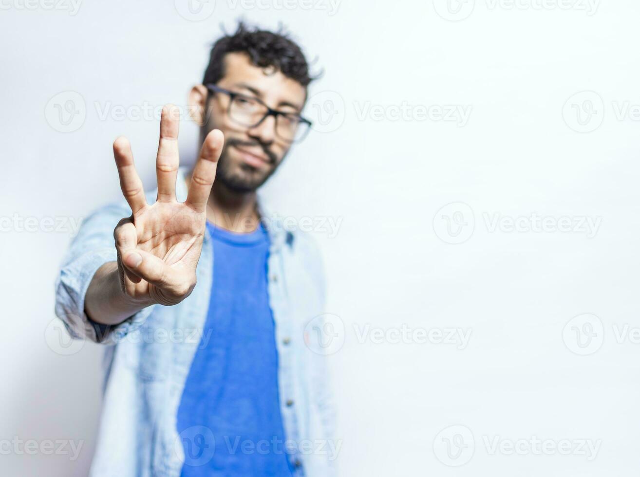 Portrait of people counting number three on isolated background. Person hand counting number ...