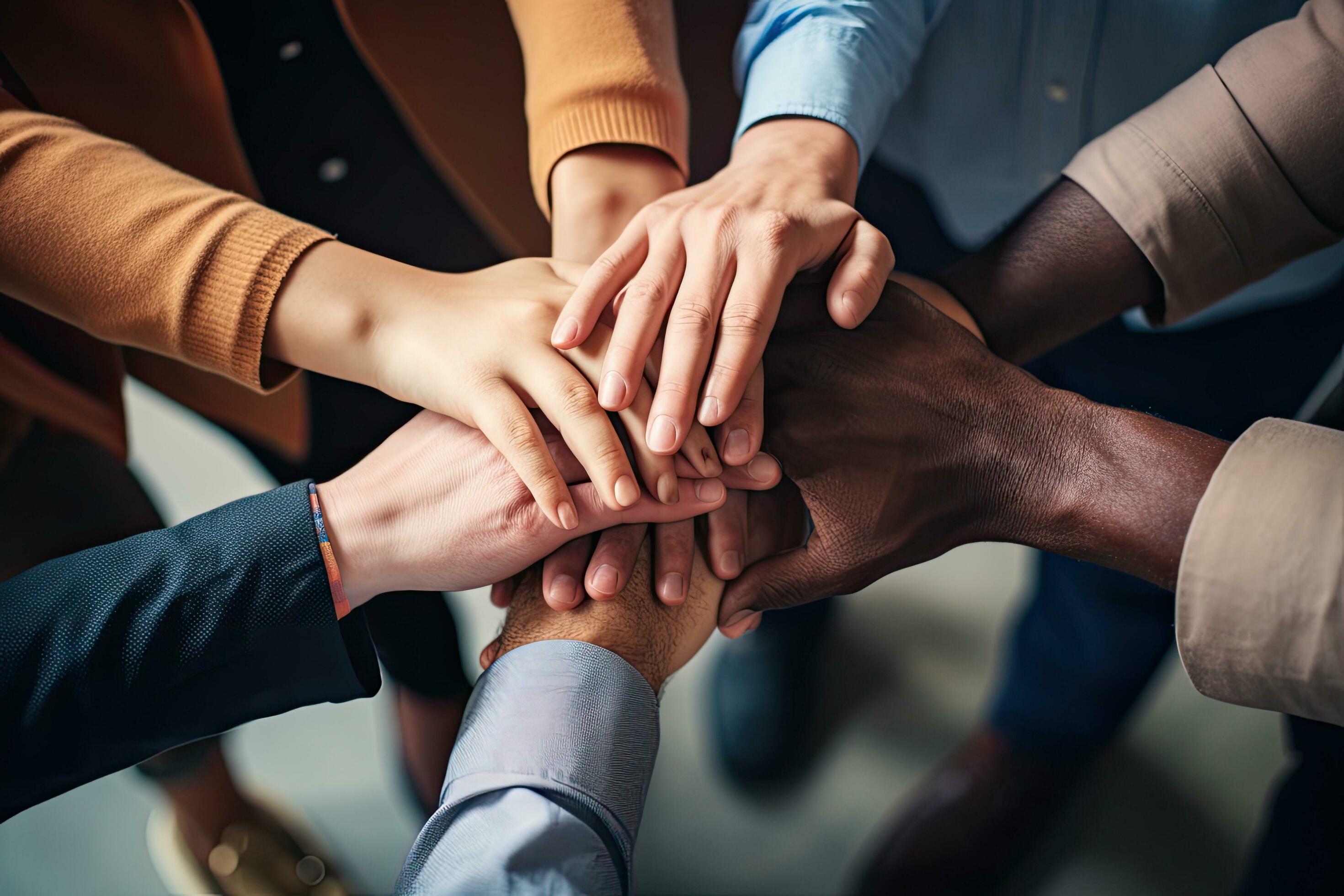 Group of business people putting their hands together. Teamwork concept ... Group of business people putting their hands together. Teamwork concept ...
