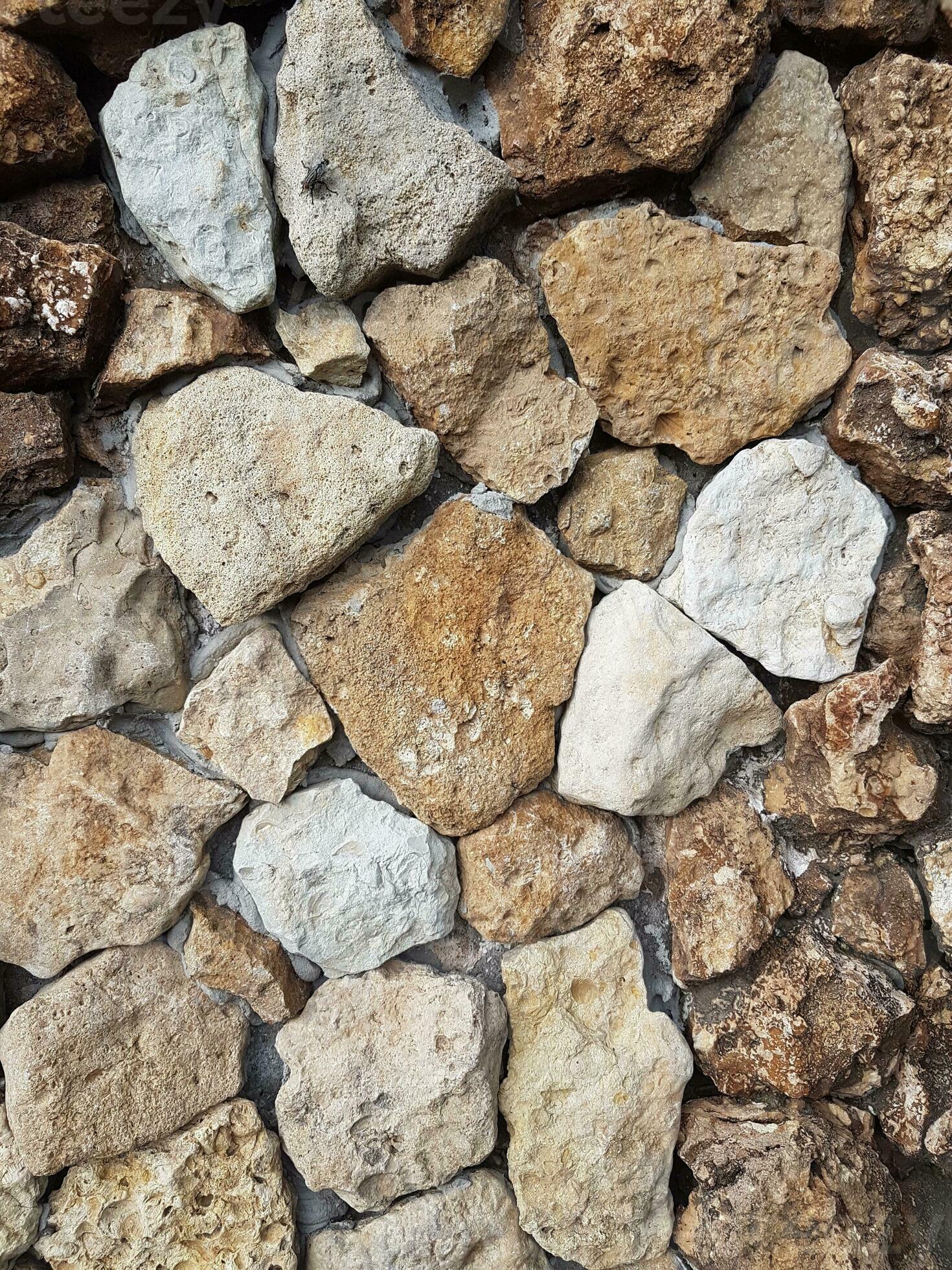 a wall made of rocks and stones 34092063 Stock Photo at Vecteezy