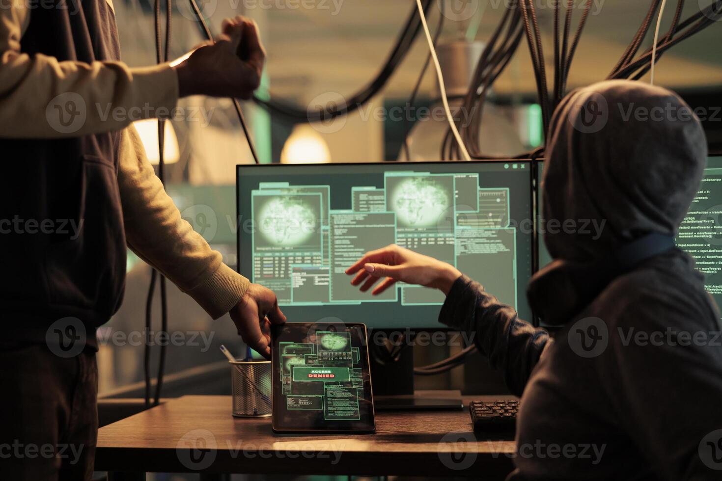 Angry Hackers Failing To Hack Computer System Online Using Monitors And Tablet Late At Night