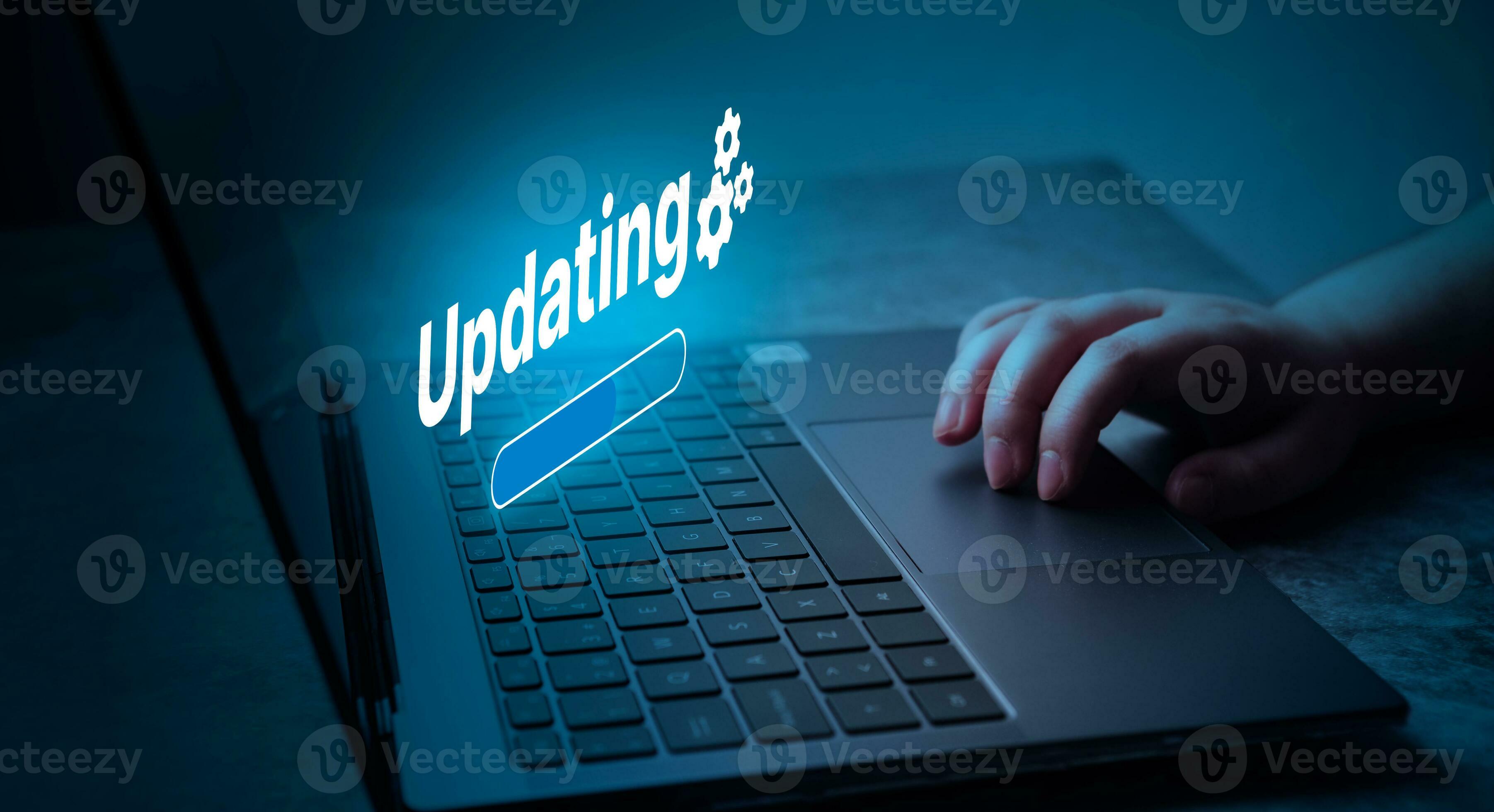 Woman Updating Software On Laptop System Engineer And Programming Software Apps Developer