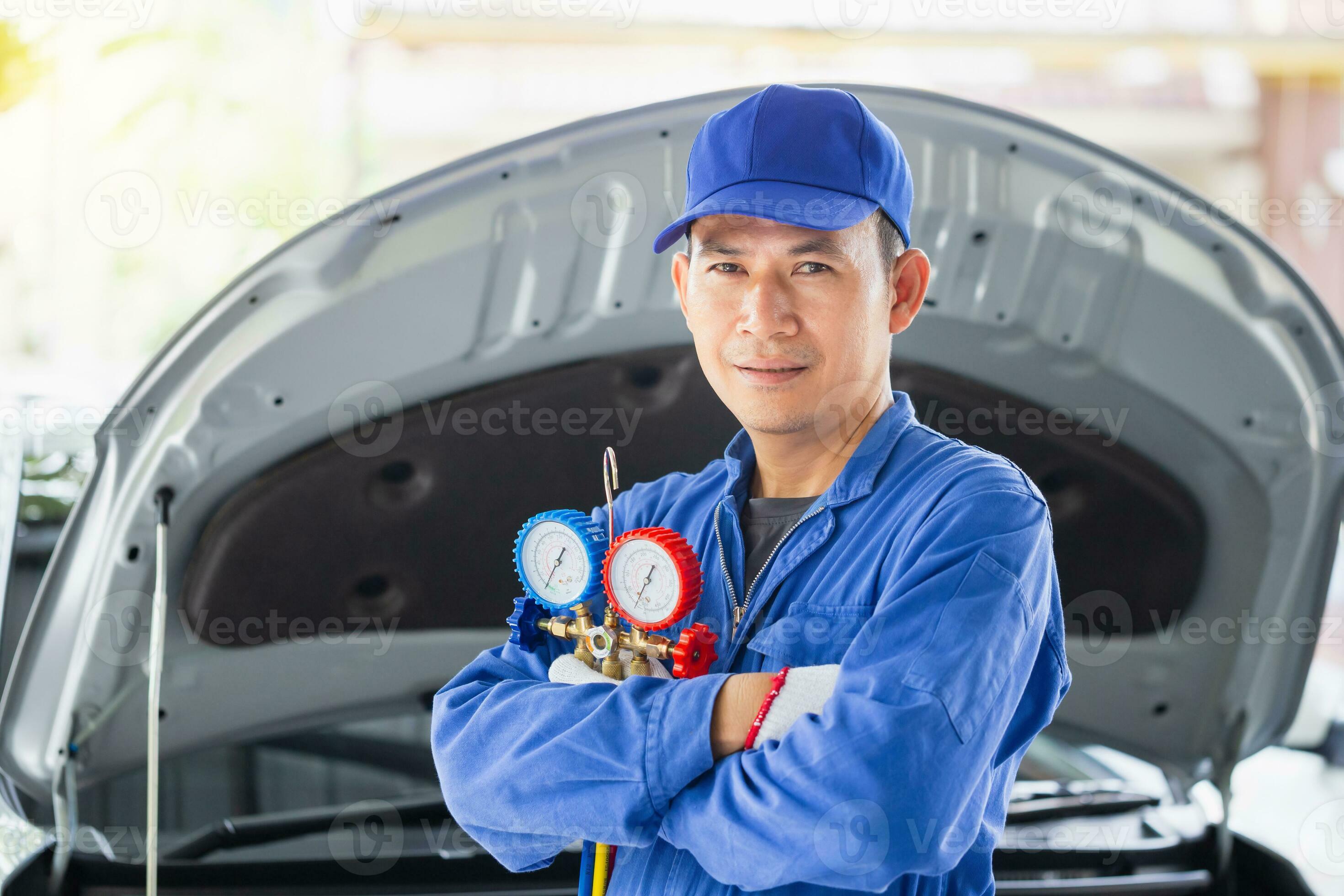 Car Air Conditioning Repair, Repairman holding monitor tool to check and fixed car air ...