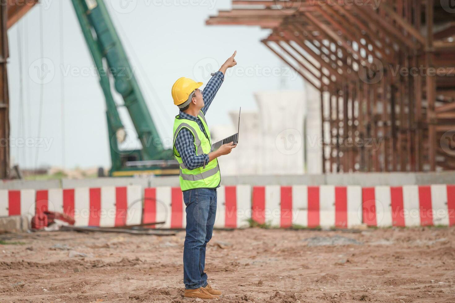 Engineer Man With Laptop At Infrastructure Construction Site Foreman Worker Checking Project In
