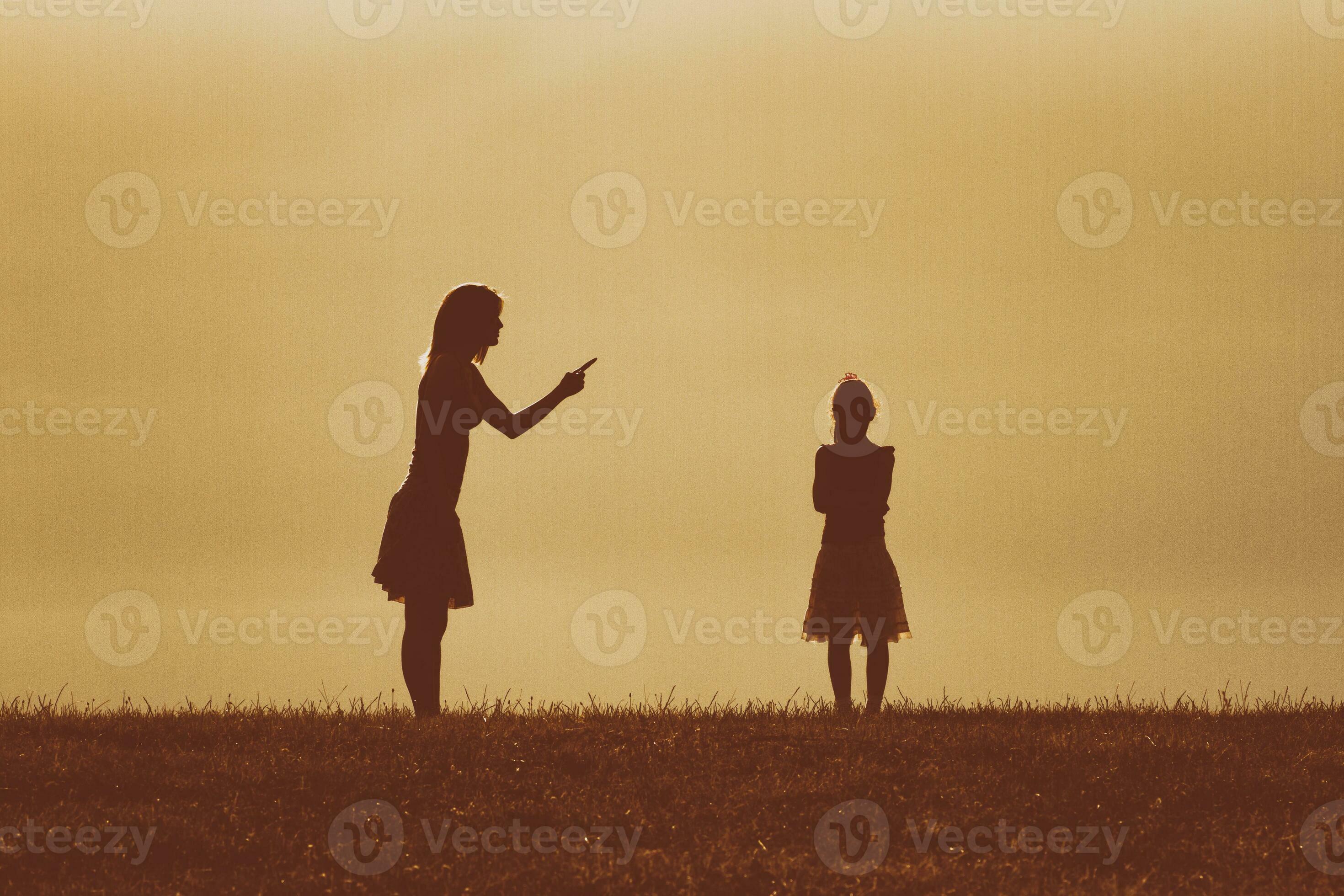Silhouette of a angry mother scolding her daughter 34824229 Stock Photo at Vecteezy