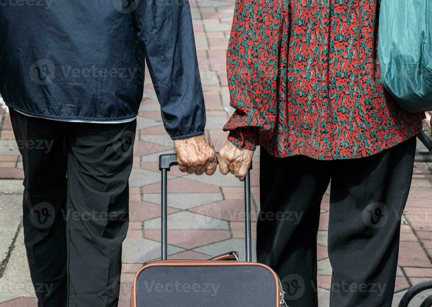 Back view grandparents dragging a suitcase 35042383 Stock Photo at Vecteezy