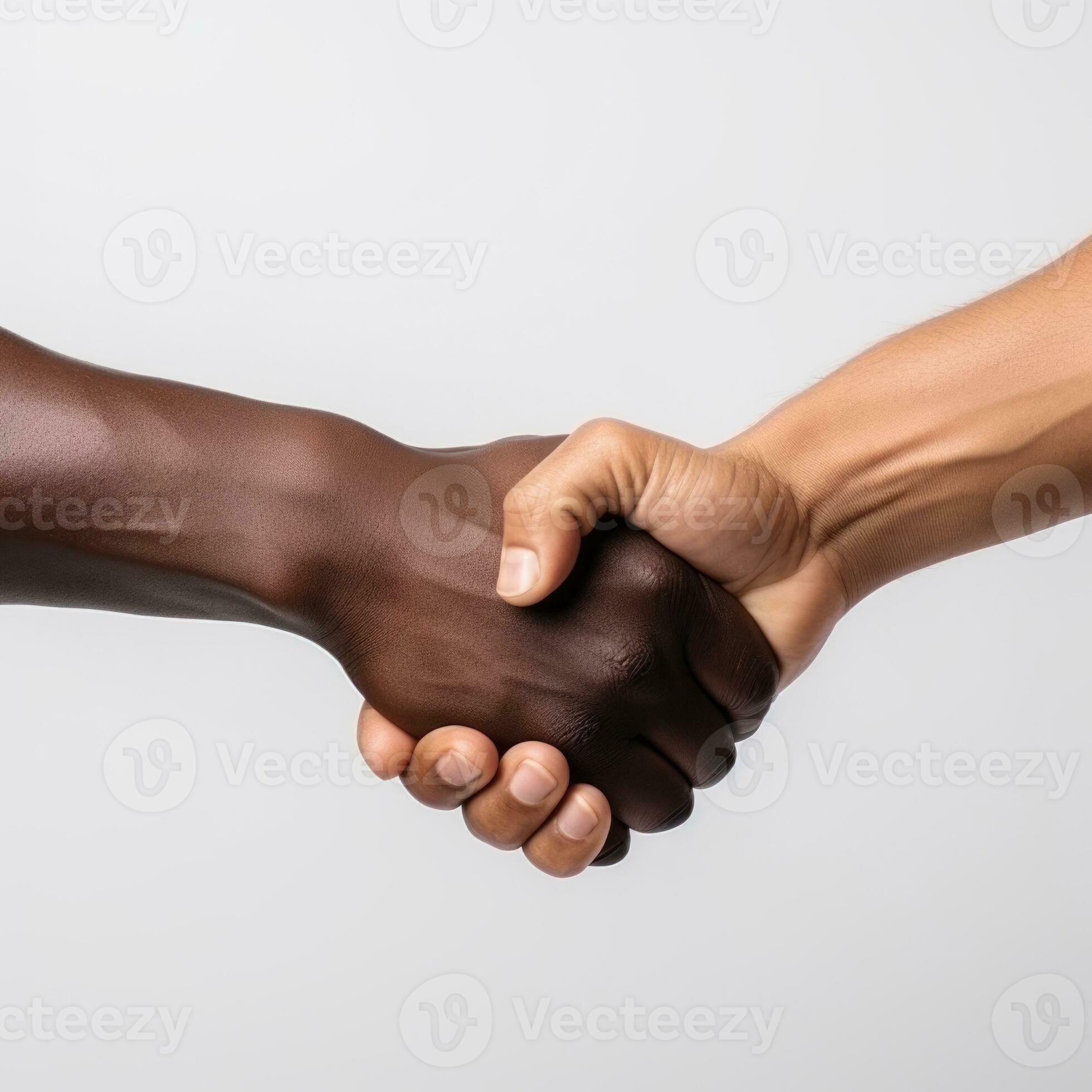 Closeup of two arms different race skin colors multinational friends shaking hands. AI Generated ...