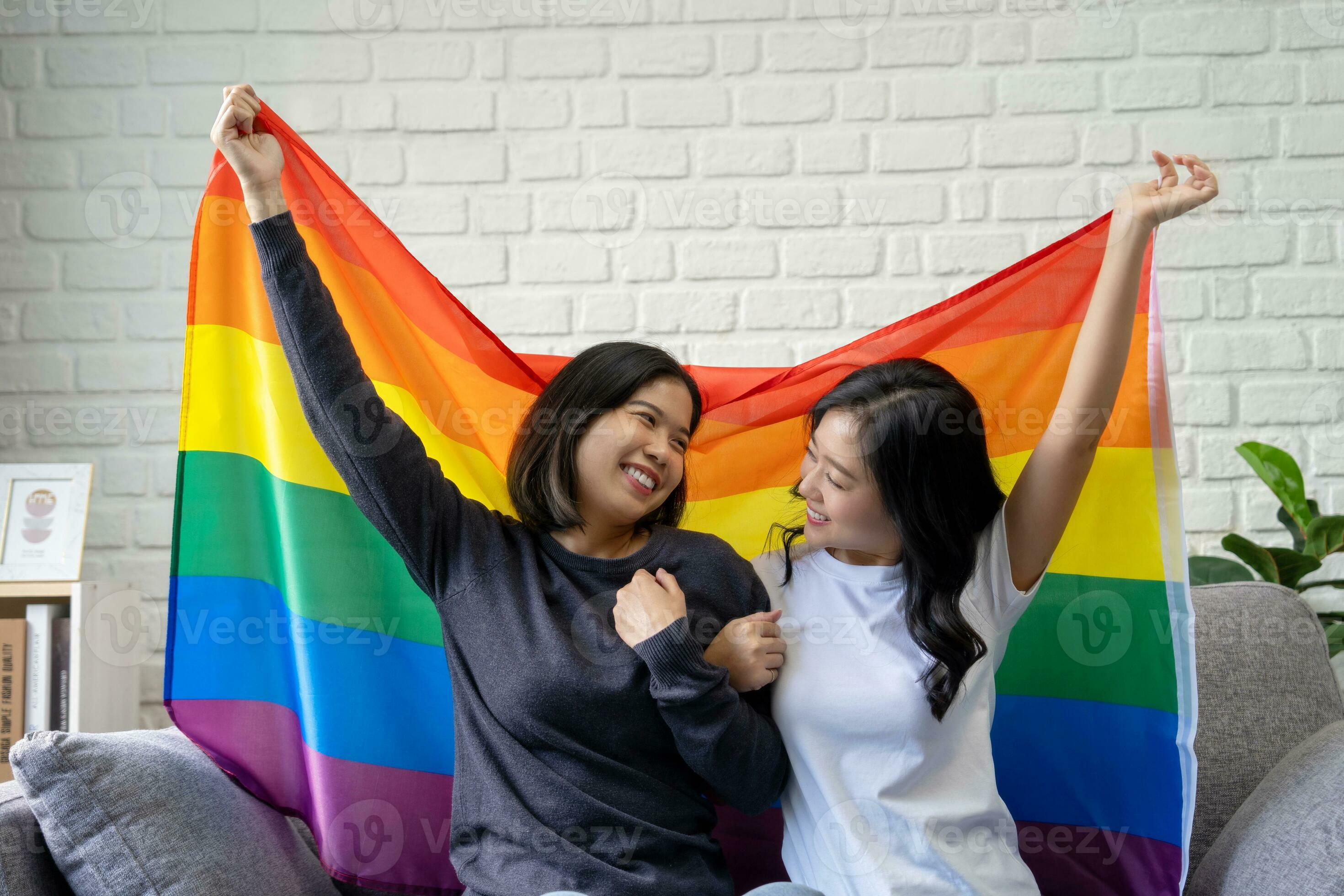 Lgbtq Asian Lesbian Young Couple Smiling Holding Pride Flag Happiness
