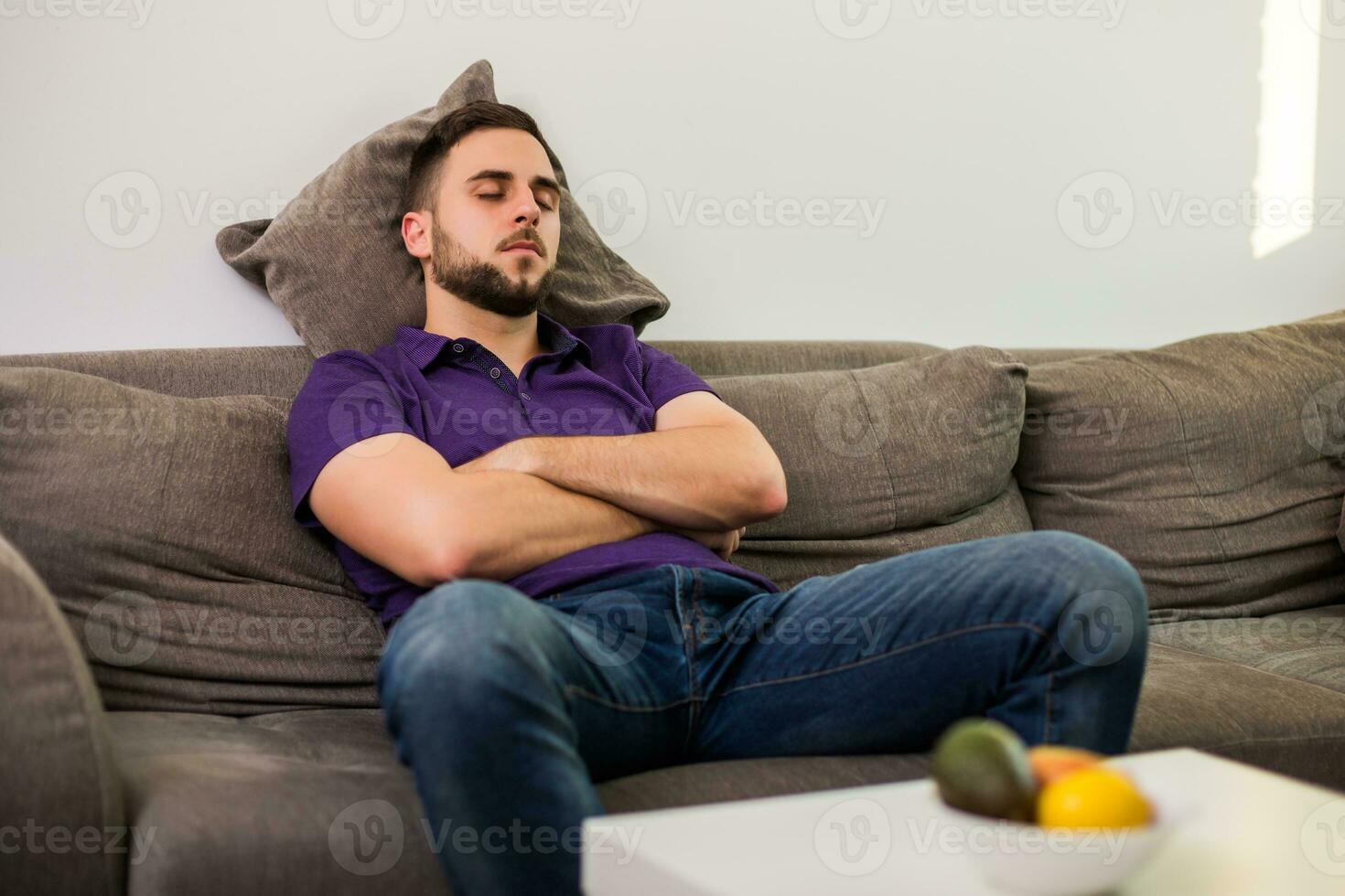 Man fell asleep while while sitting on sofa in his living room ... Man fell asleep while while sitting on sofa in his living room ...