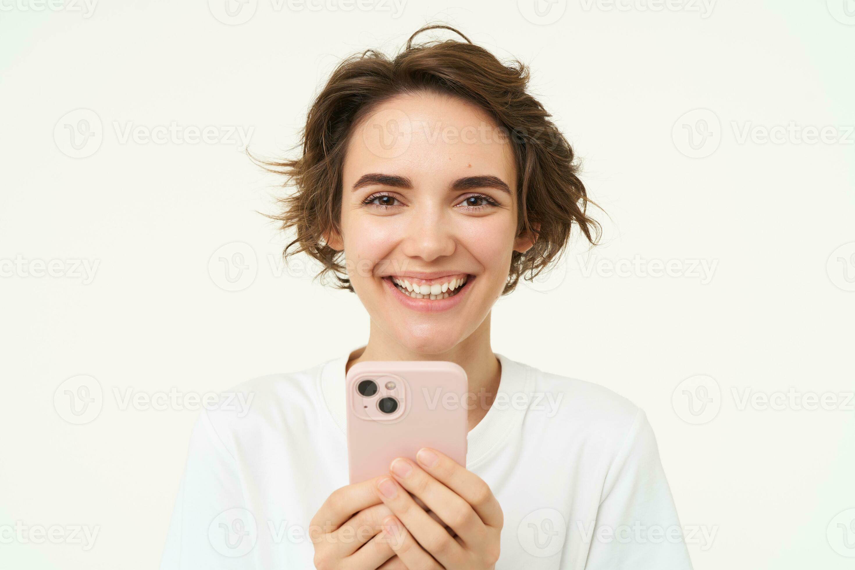 Close up of laughing smiling woman, holding smartphone, using mobile app, online shopping in ...