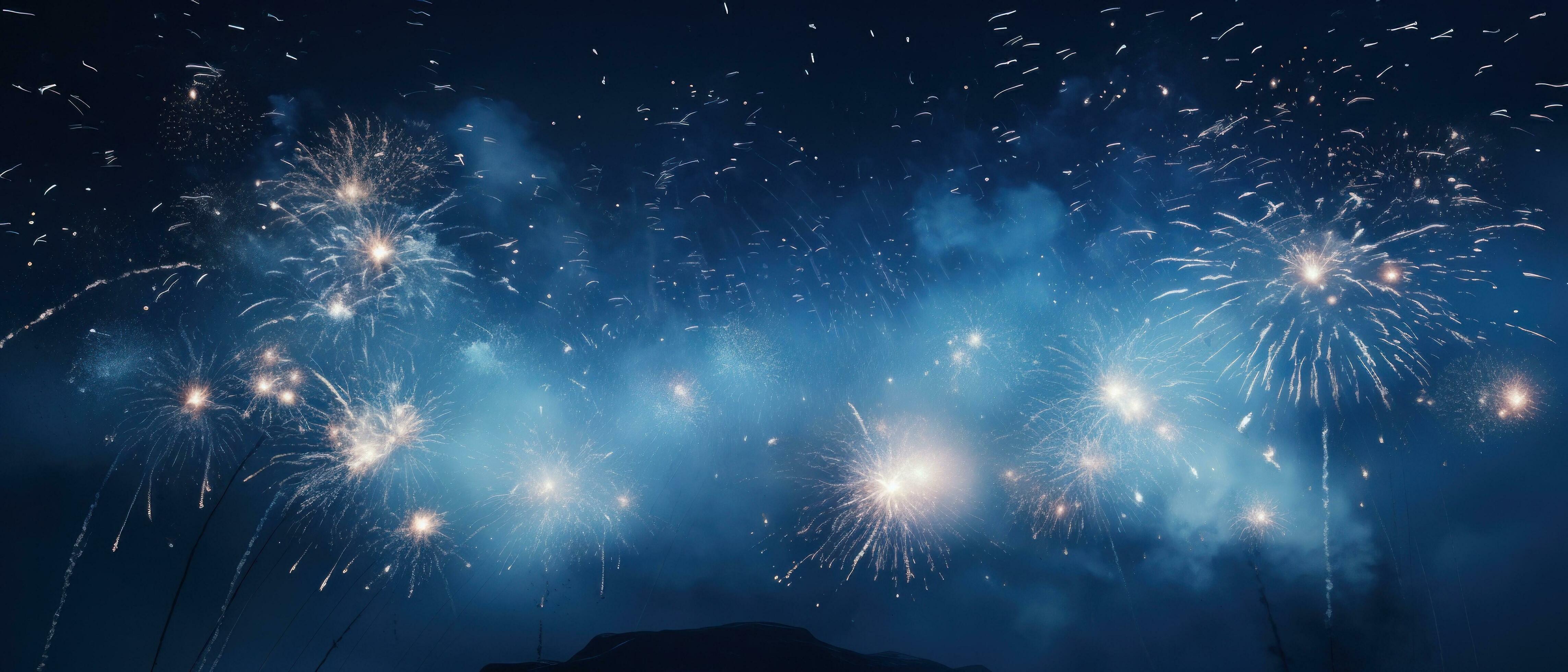 AI generated fireworks fire up in the sky over a blue background, 35848064 Stock Photo at Vecteezy