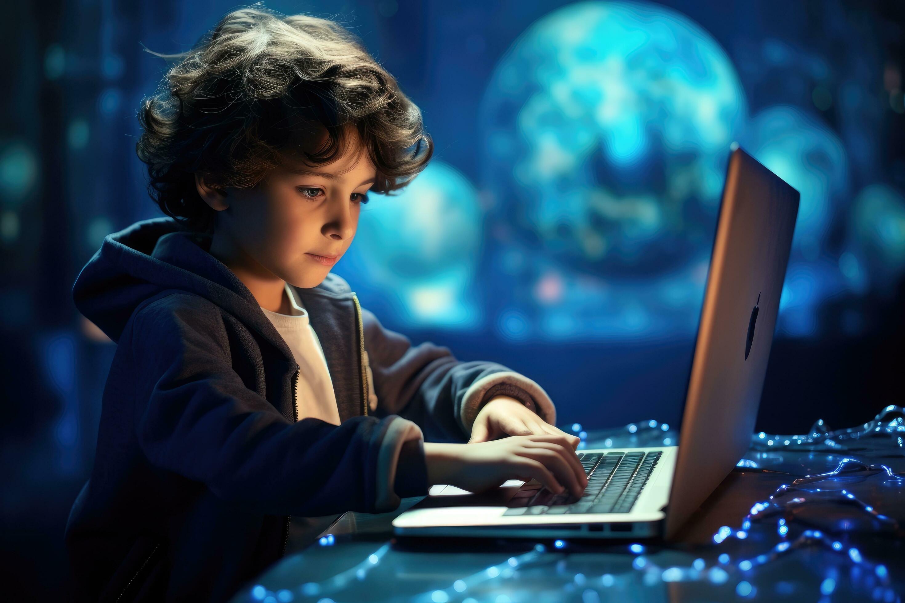 AI generated Little boy playing with a laptop computer on a dark blue background, A child using ...