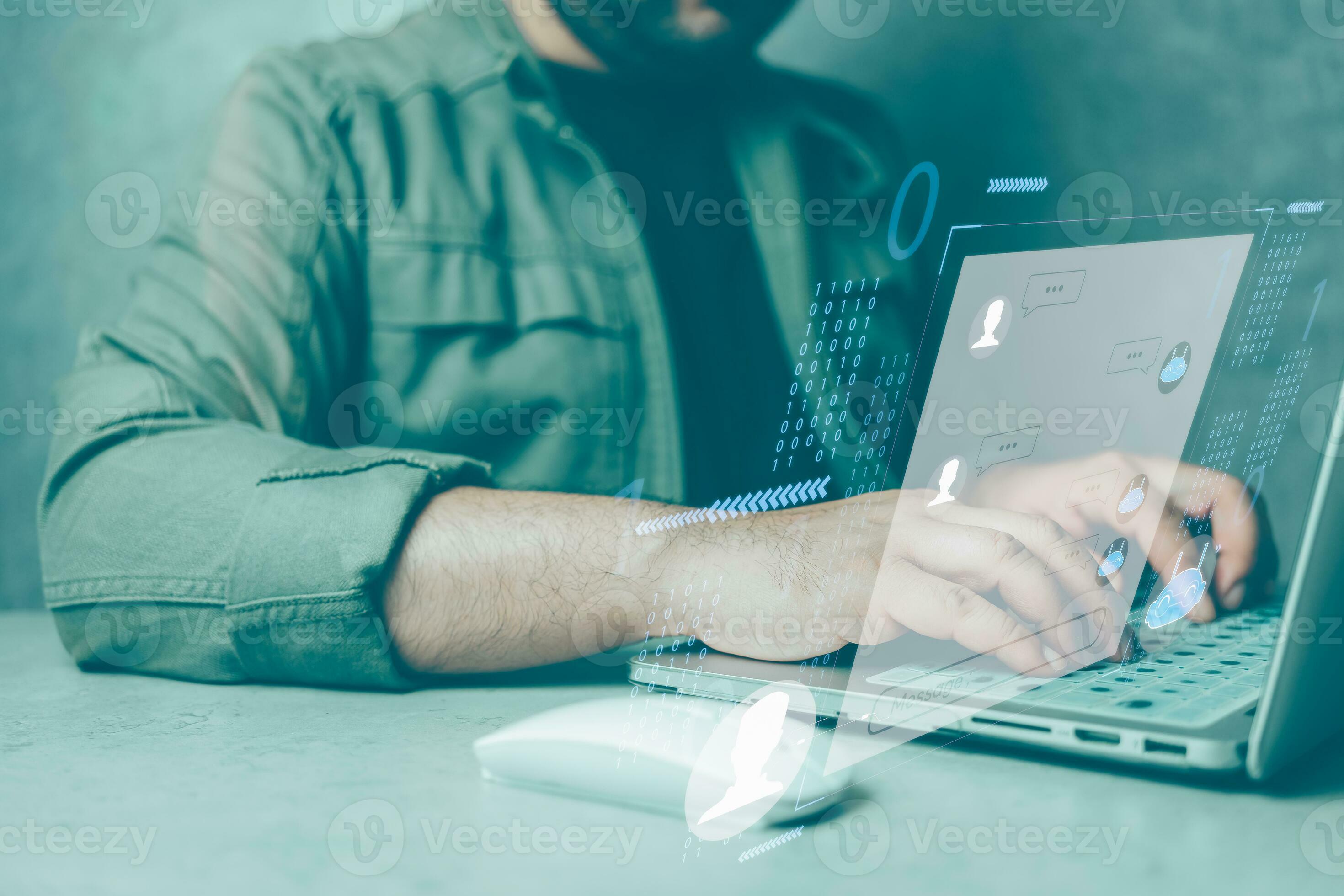 Man using a laptop computer chatting with an intelligent artificial ...