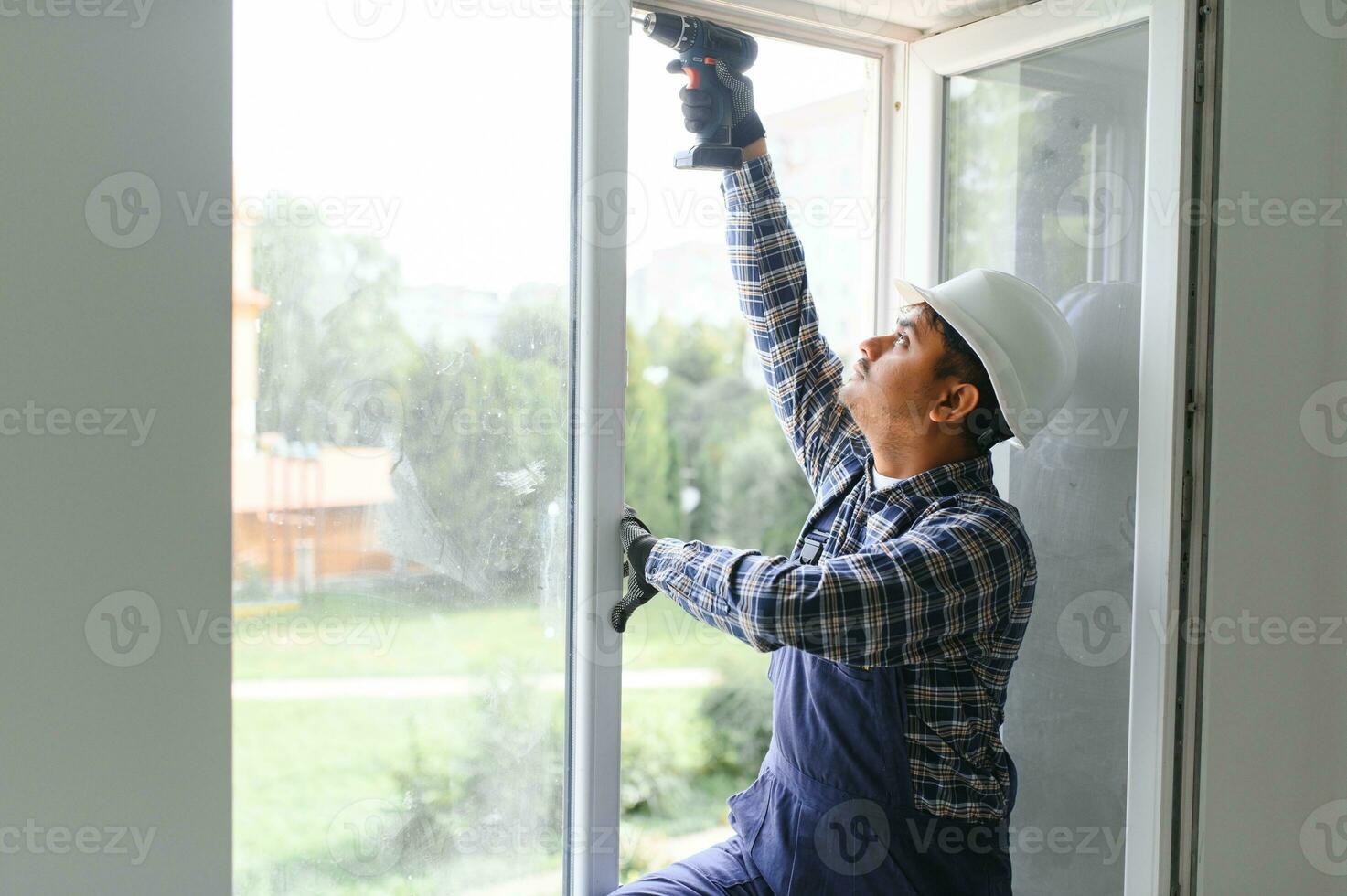 Indian service man installing window with screwdriver 36384212 Stock ... Indian service man installing window with screwdriver 36384212 Stock ...