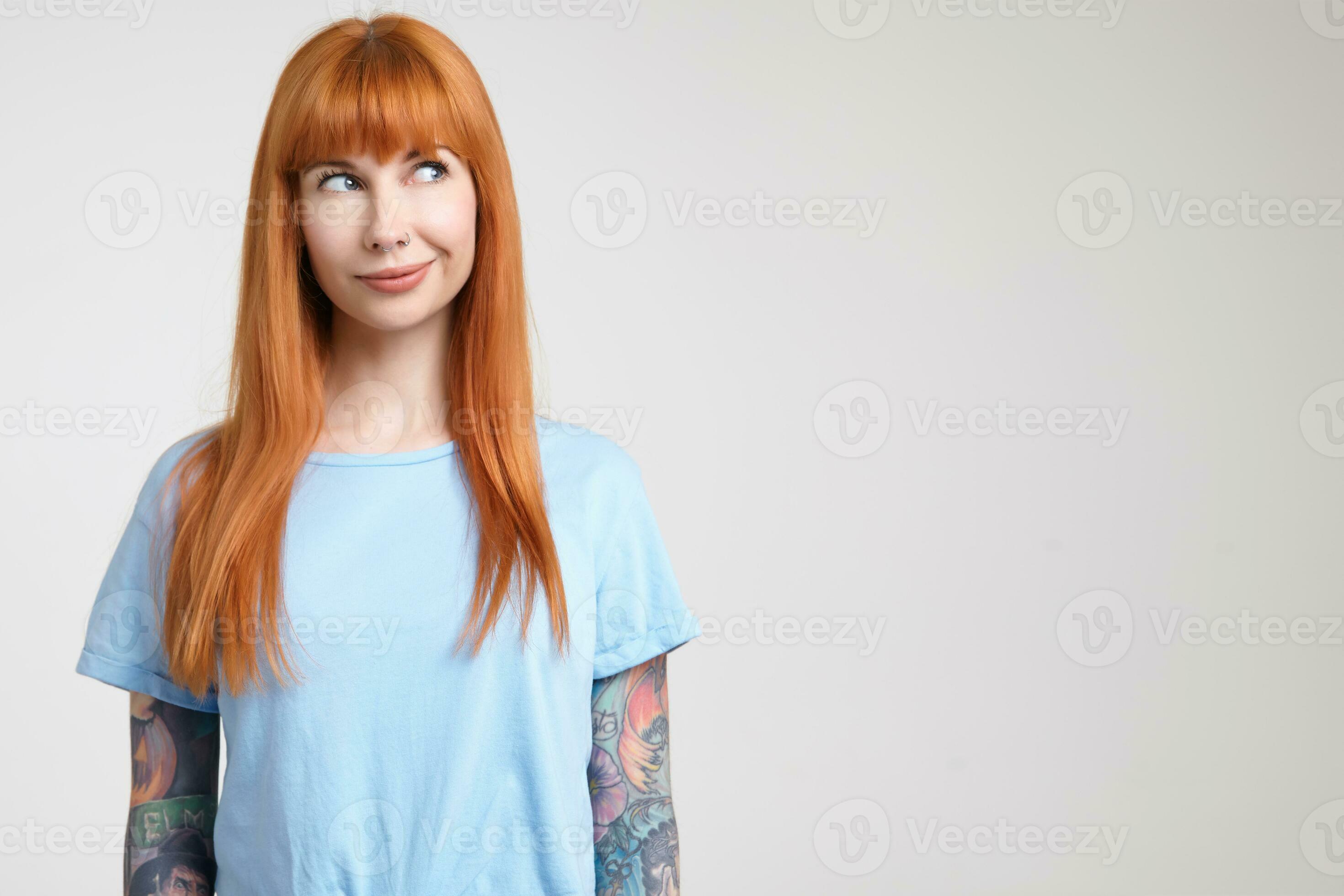Horizontal Photo Of Young Long Haired Redhead Woman With Tattoos