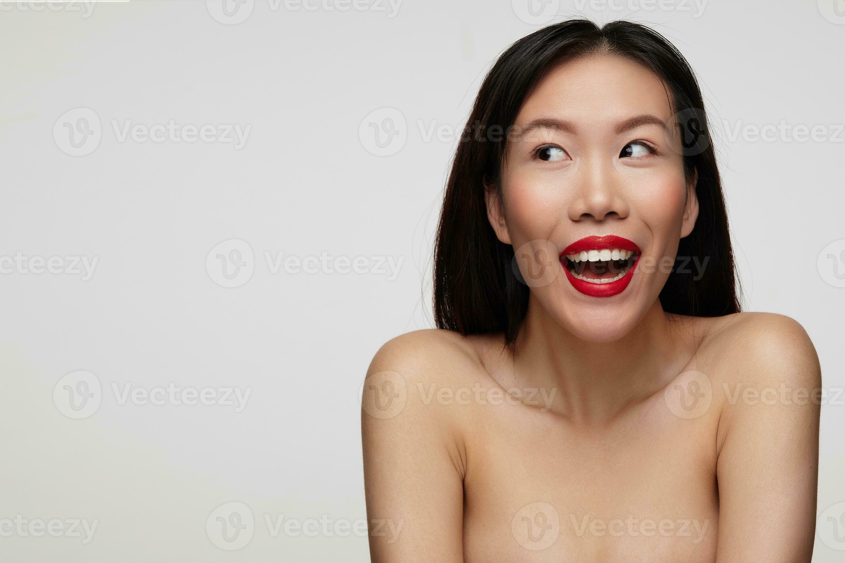 Overjoyed Young Beautiful Dark Haired Female With Festive Makeup