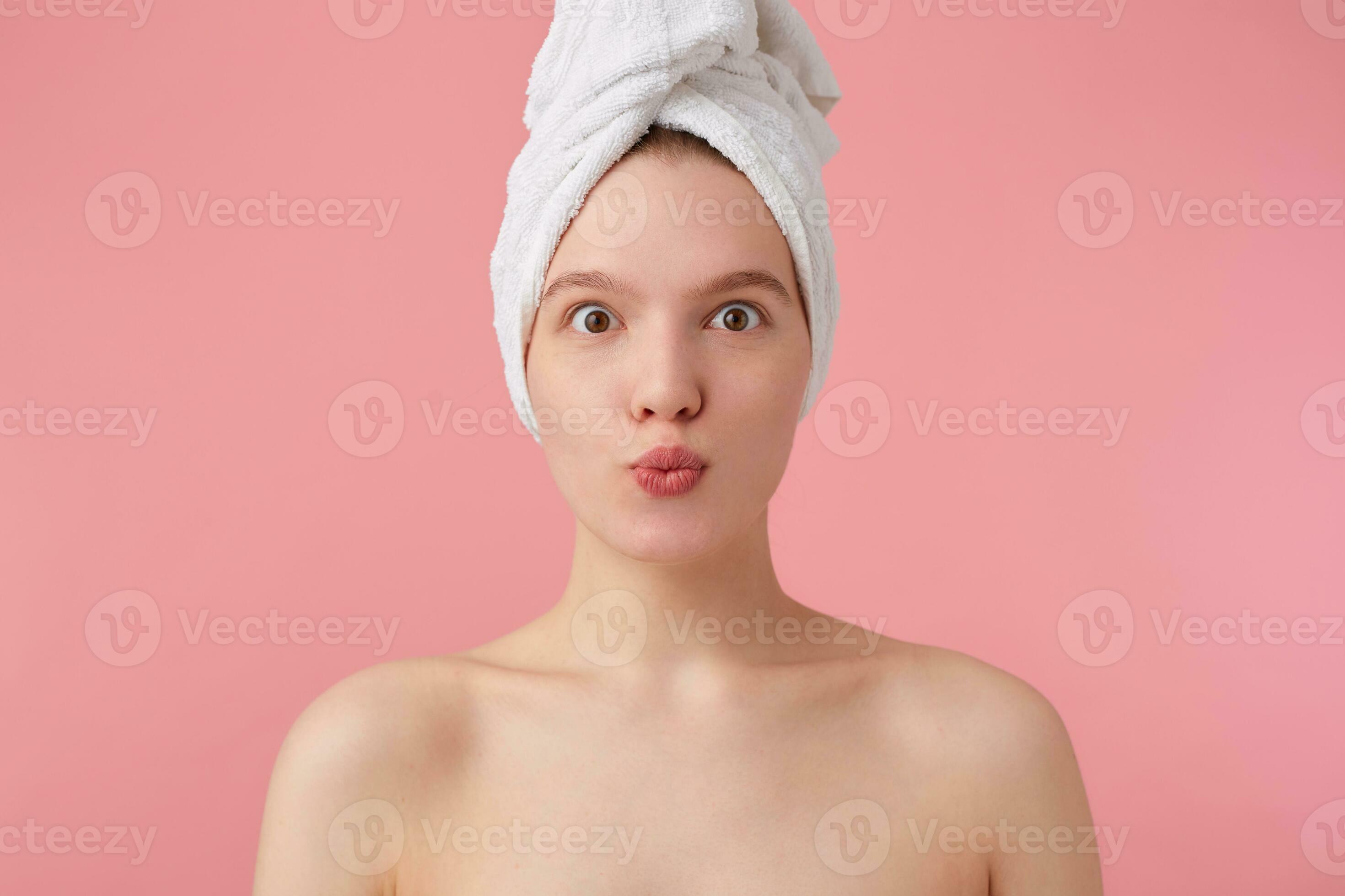 Portrait Of Young Happy Woman After Shower With A Towel On Her Head