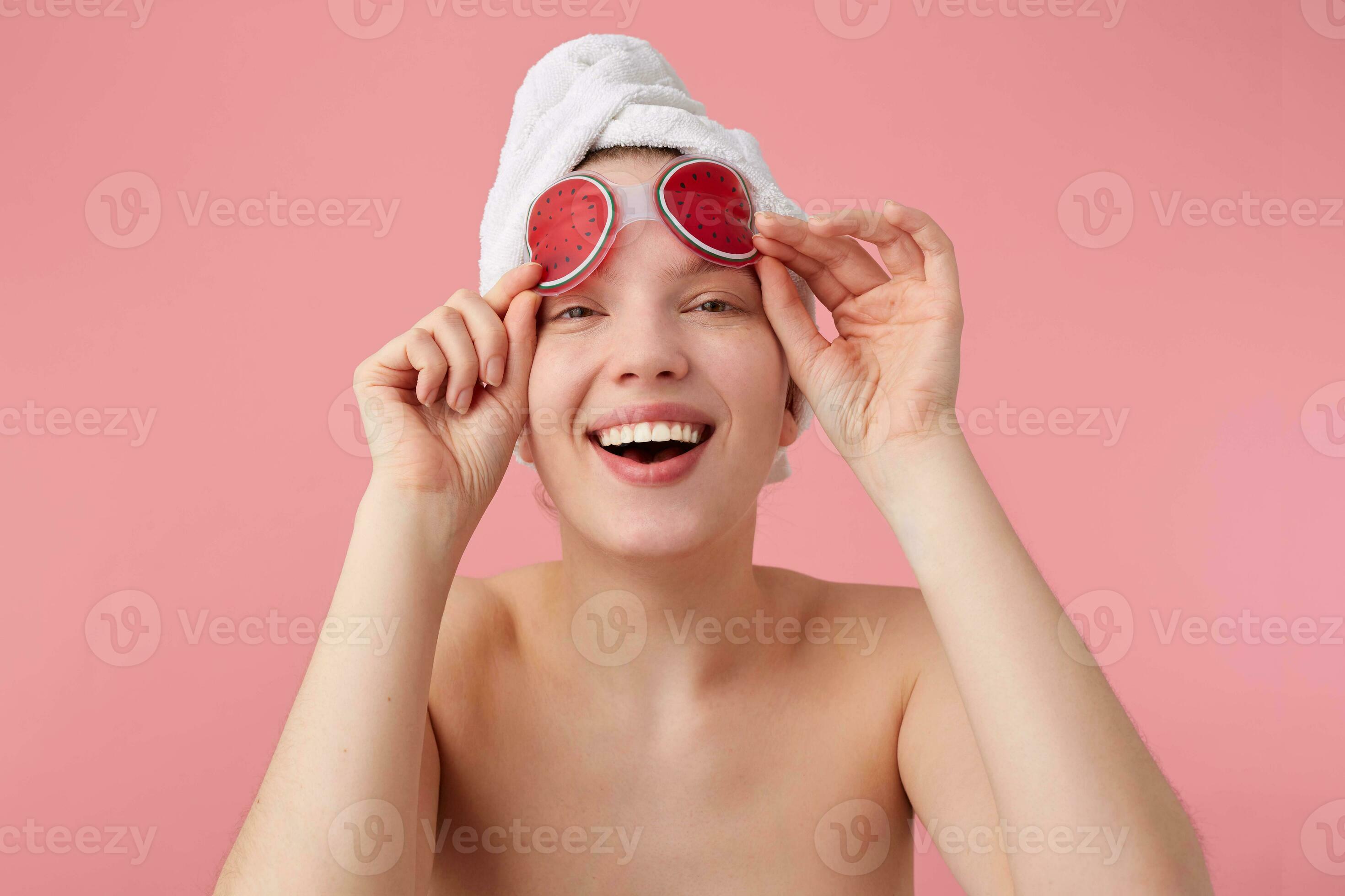 Young Happy Woman After Shower With A Towel On Her Head Broadly Smiles