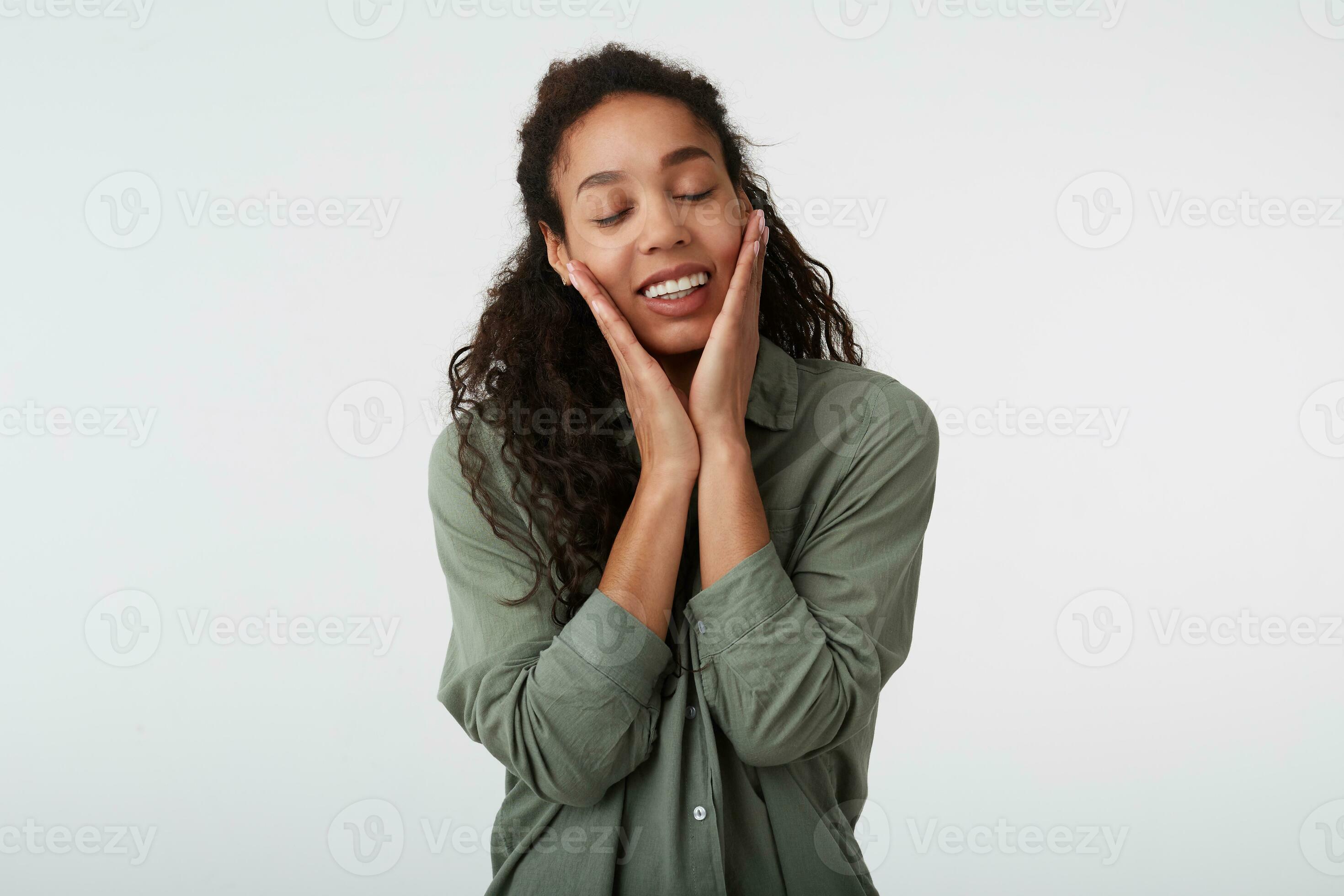 Pleasant Looking Young Positive Long Haired Curly Brunette Woman With