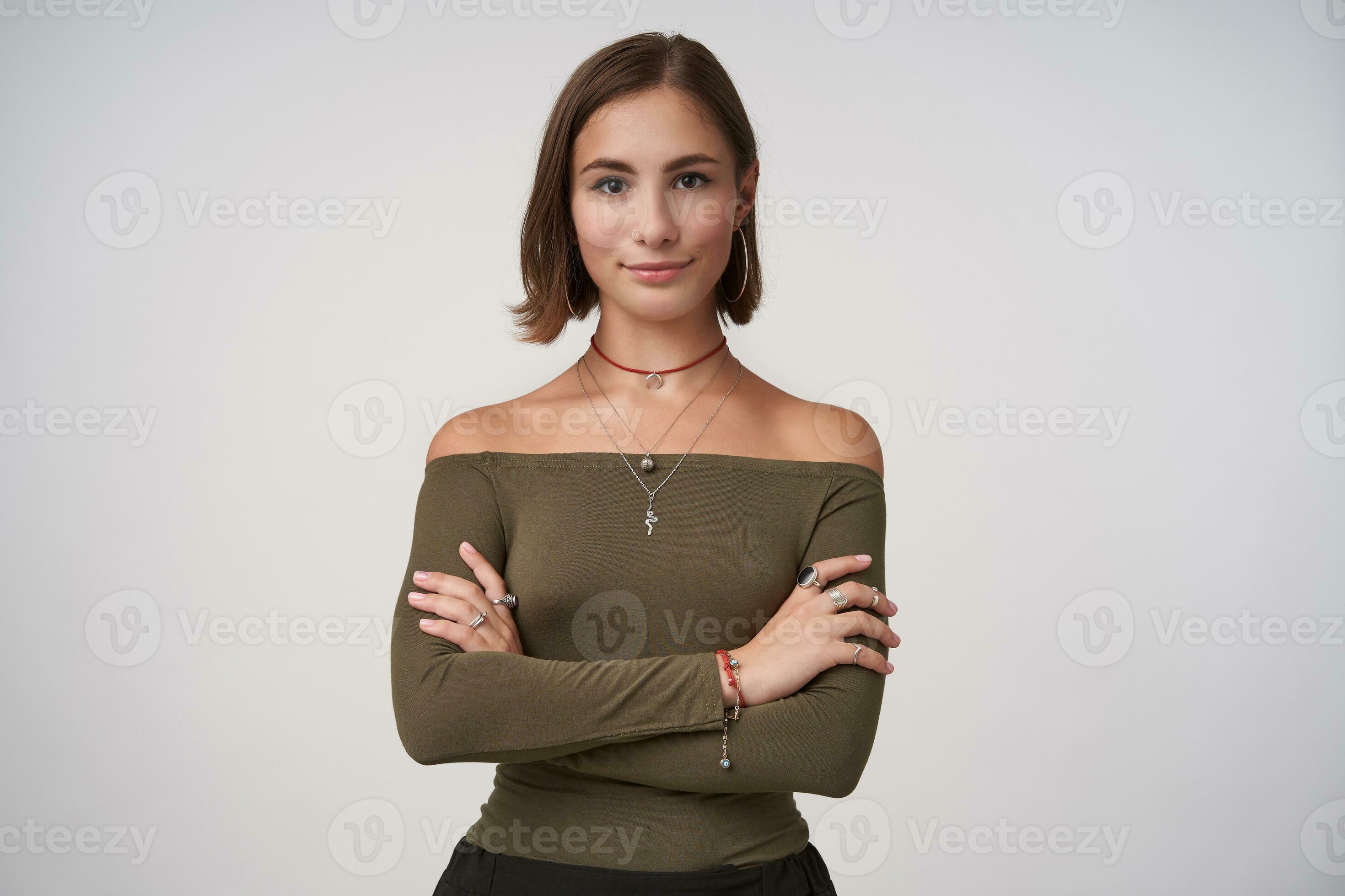 Positive Young Lovely Short Haired Brunette Lady Smiling Slightly While