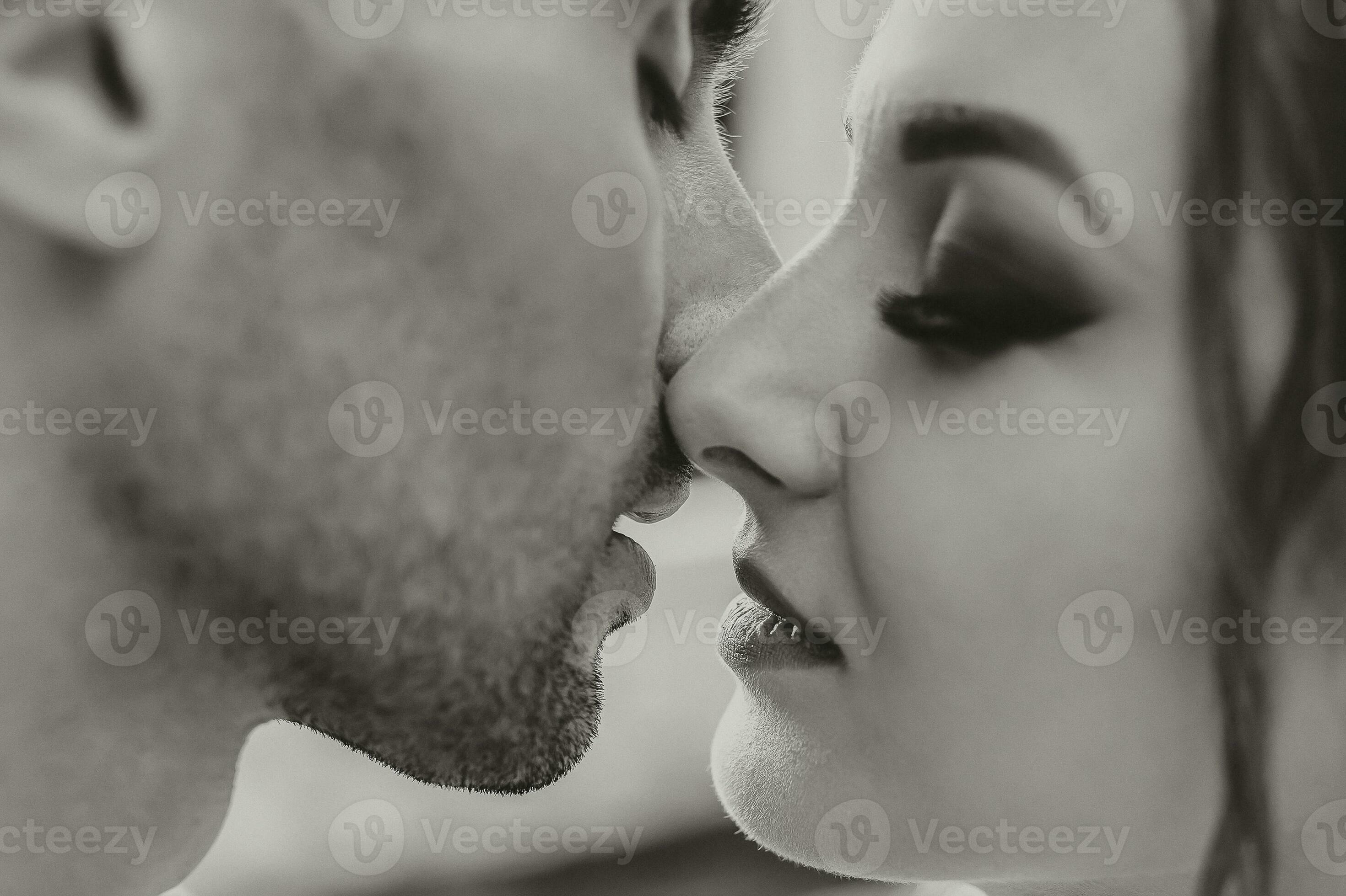 Sensual couple in tender passion. Close-up portrait of a woman about to kiss a man. Couple in ...