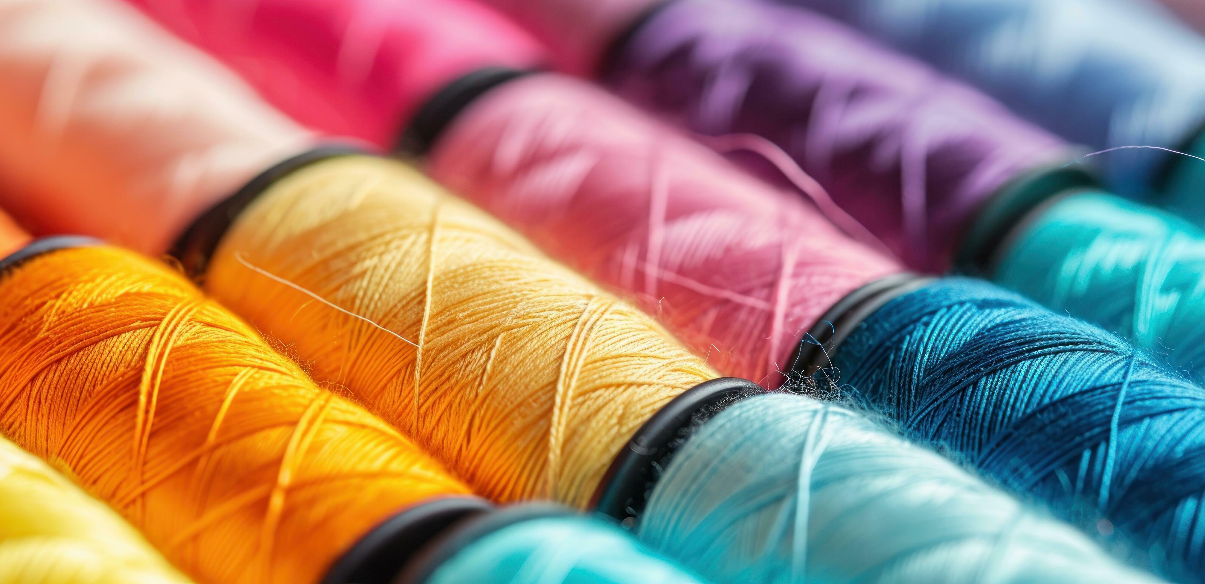 AI generated multiple colors of spools of threads are displayed close ...