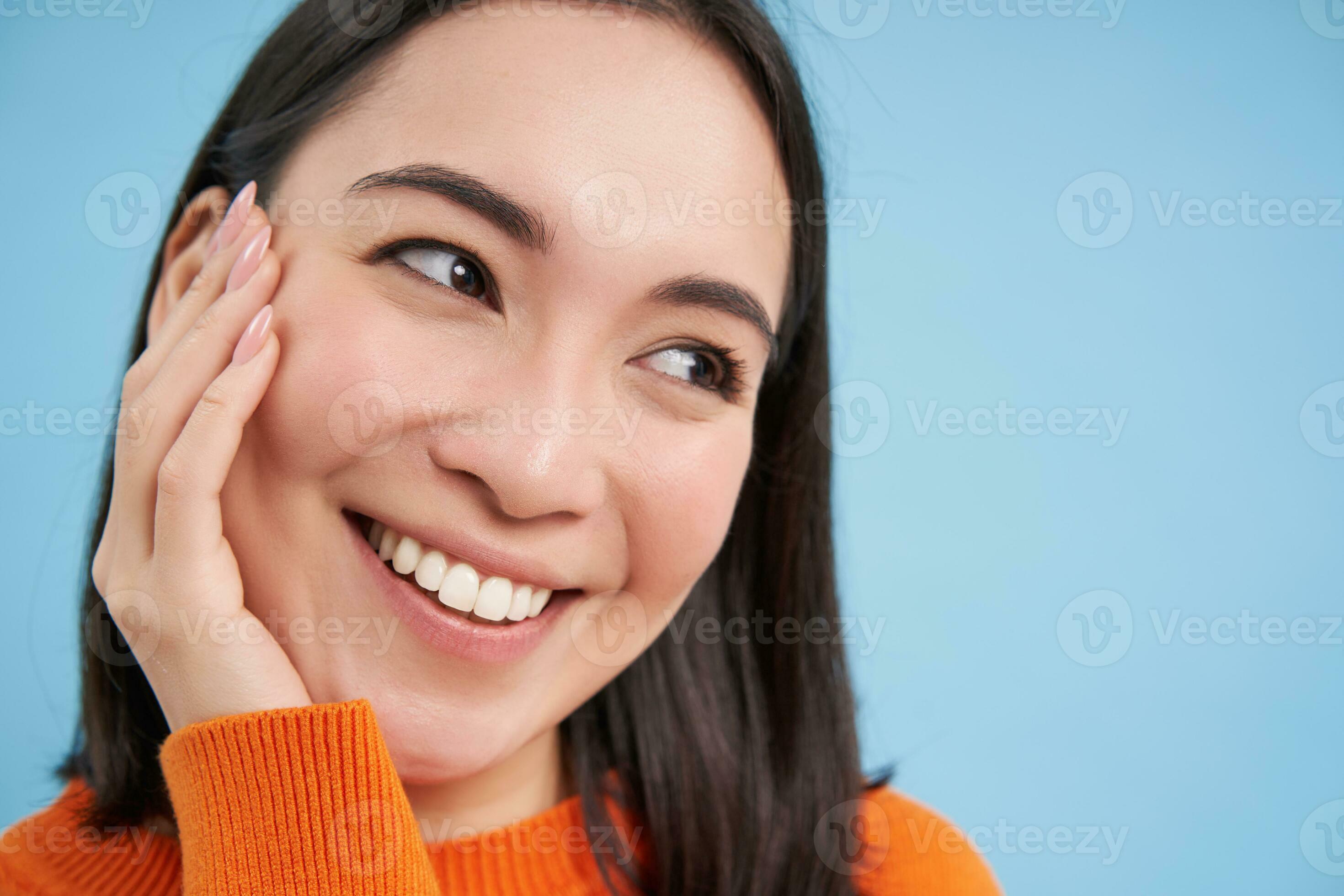 Beauty And Skincare Happy Asian Woman Touches Her Skin Clear Healthy