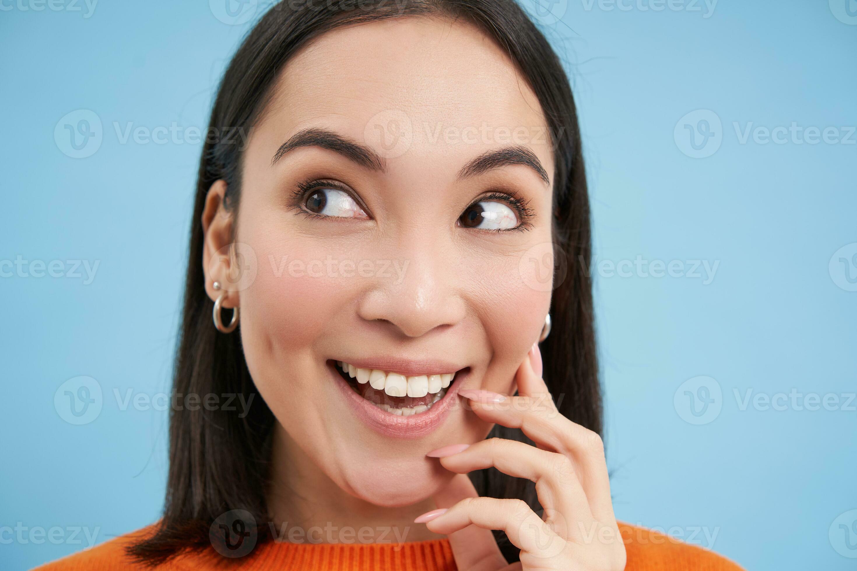 Beauty And Wellbeing Close Up Portrait Of Young Happy Asian Woman