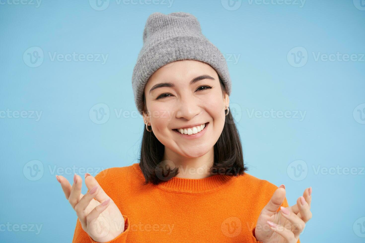 Close Up Portrait Of Happy Smiling Asian Woman Shows Open Hands