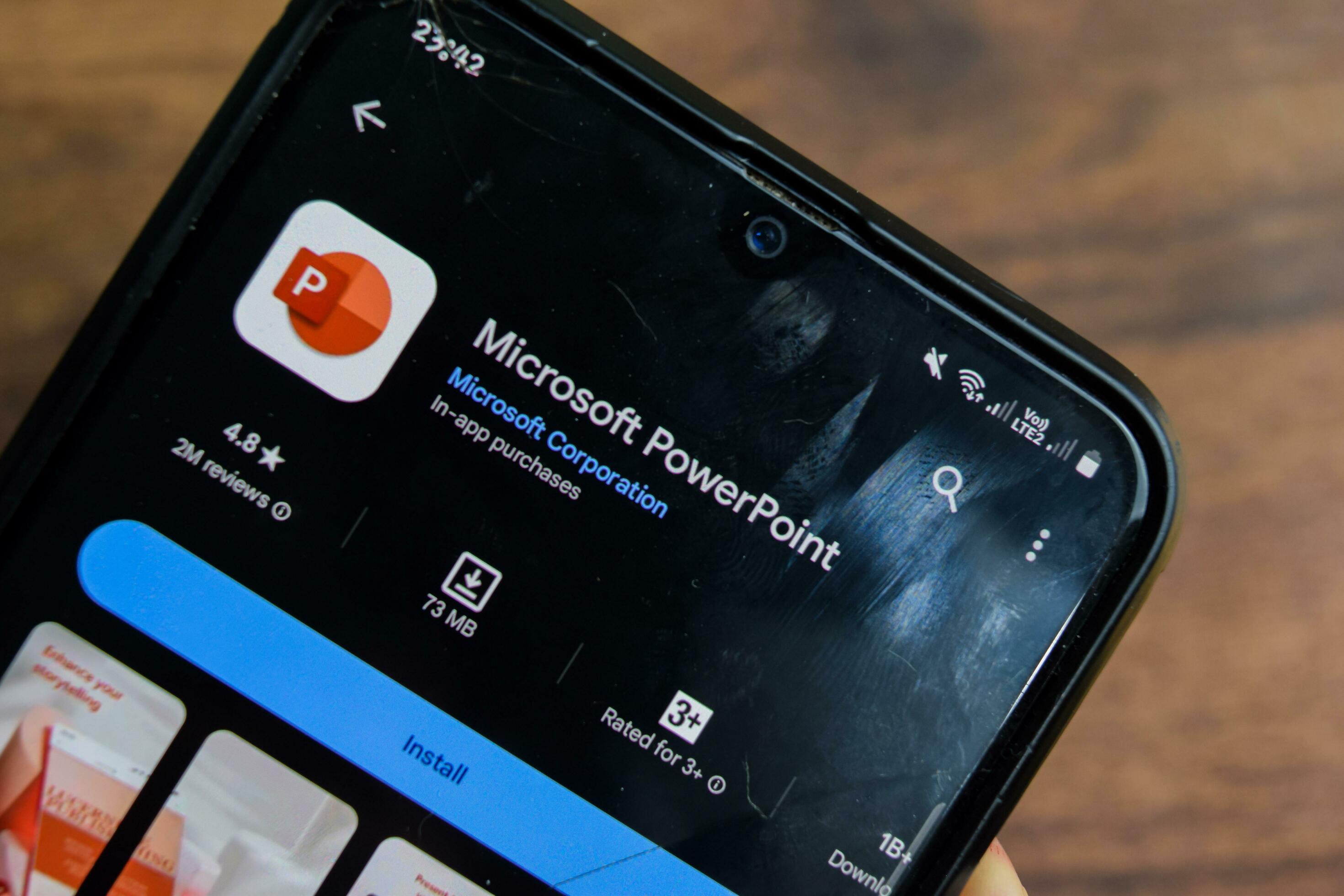 Microsoft PowerPoint application on Smartphone screen. PowerPoint is a ...
