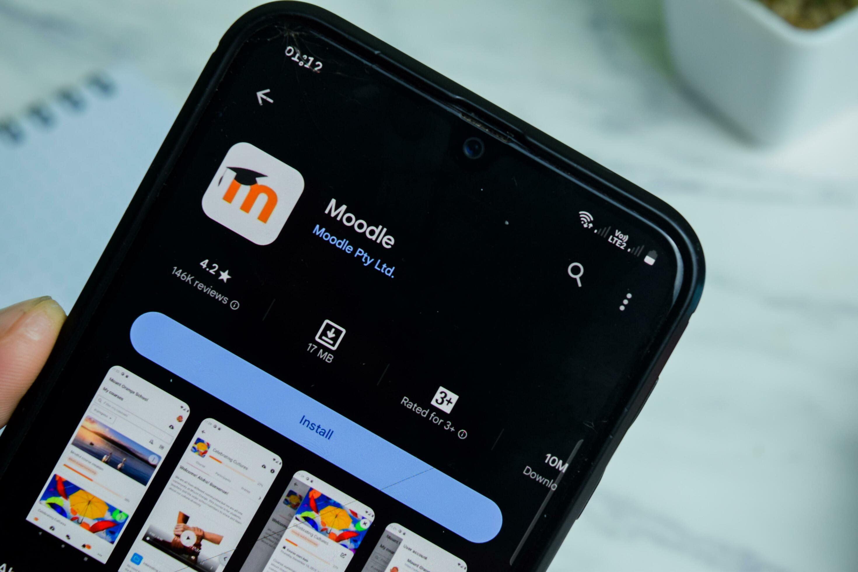 Moodle application on Smartphone screen. Moodle is a freeware web browser developed by Moddle ...