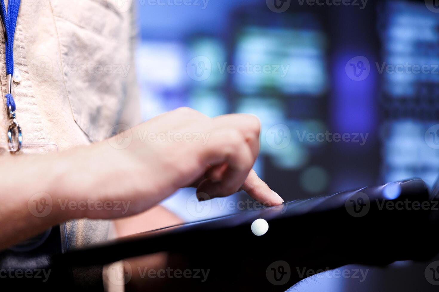Developer In Front Of Blurry Background Mainframe Rows Delivering Web Content To Clients