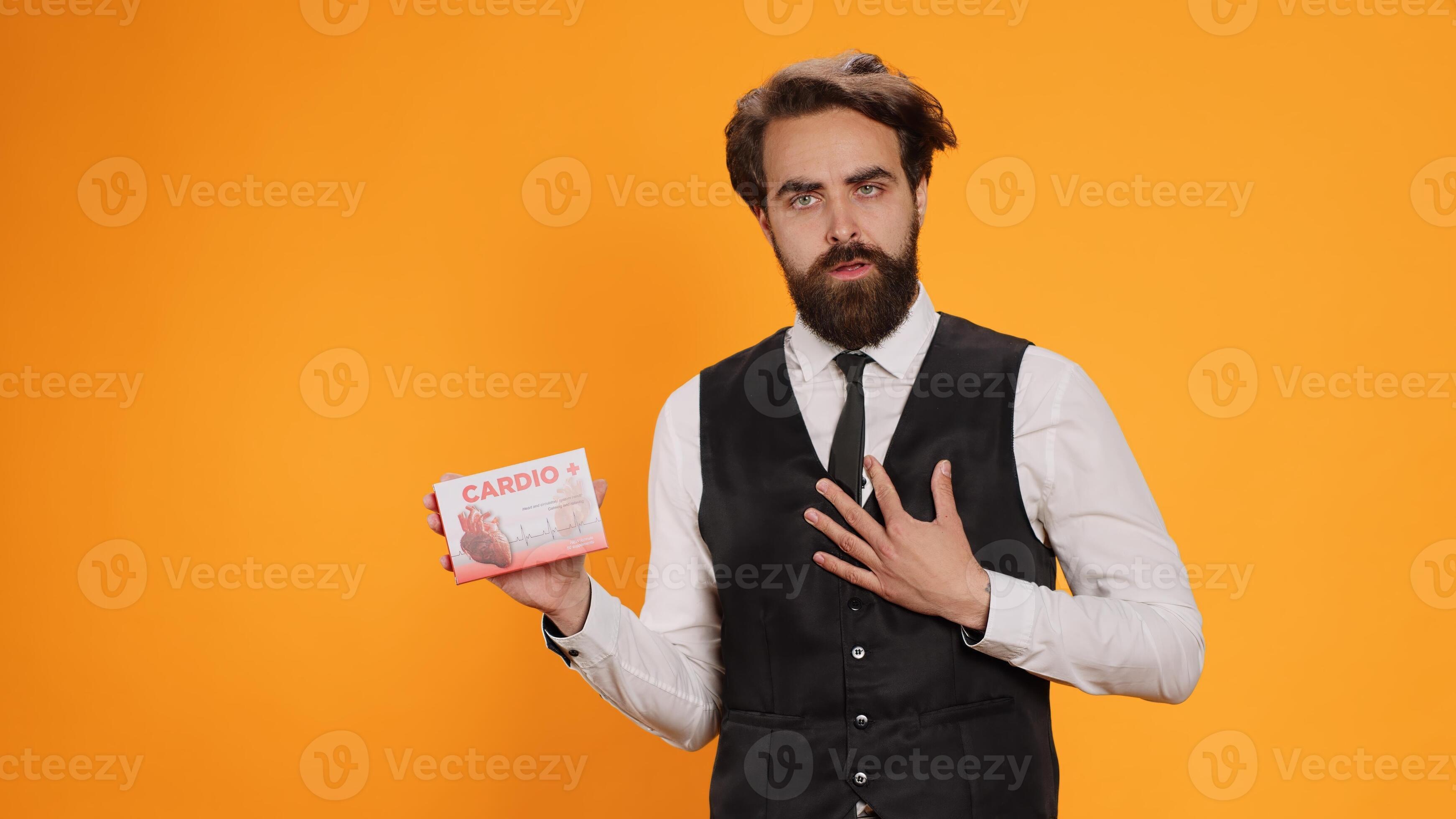 Restaurant waiter with heart problems presenting prescription medicine pills to treat cardiac ...