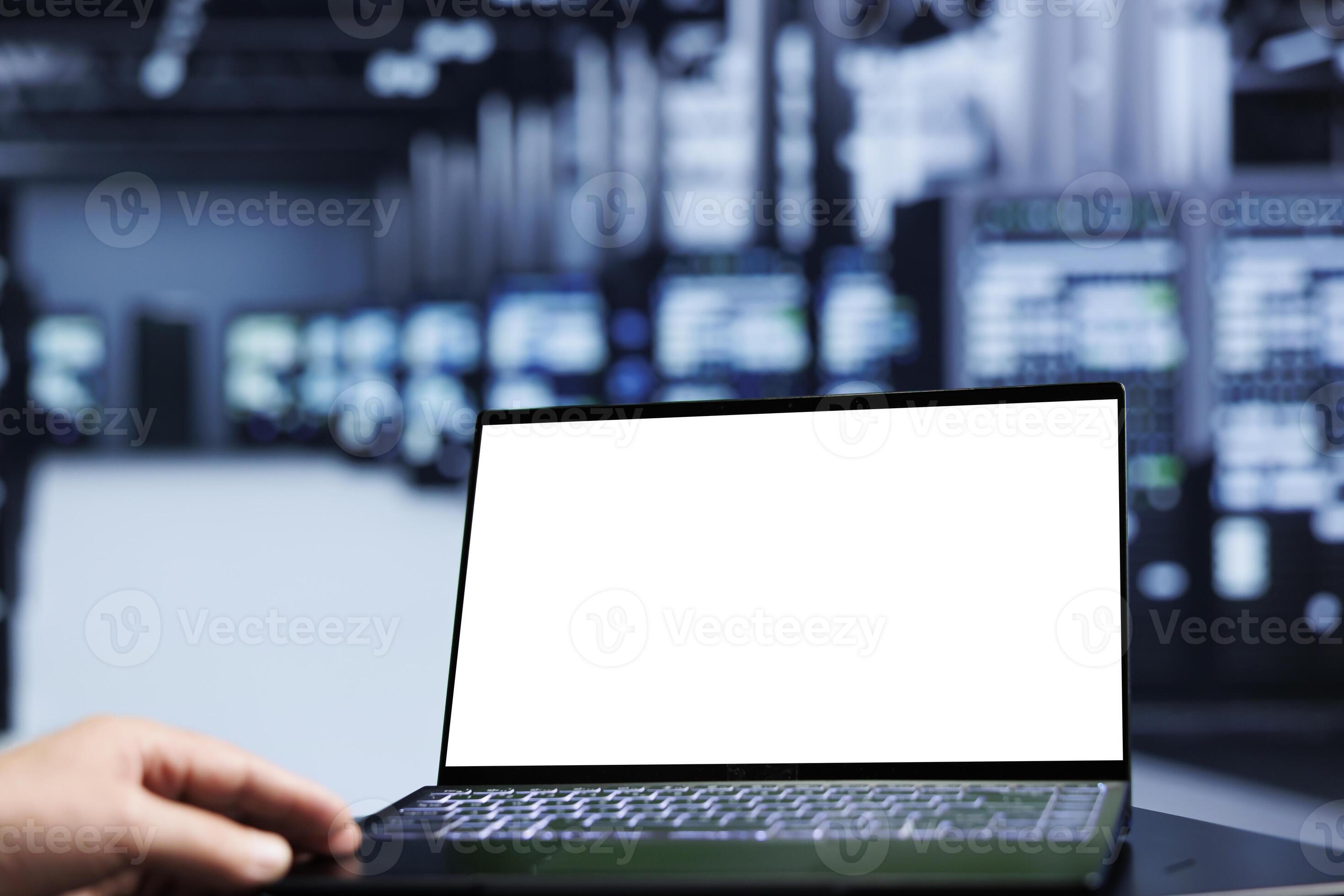 Close Up Shot Of Mock Up Laptop Used By Trained Engineer In Data Center Using Server Rows To