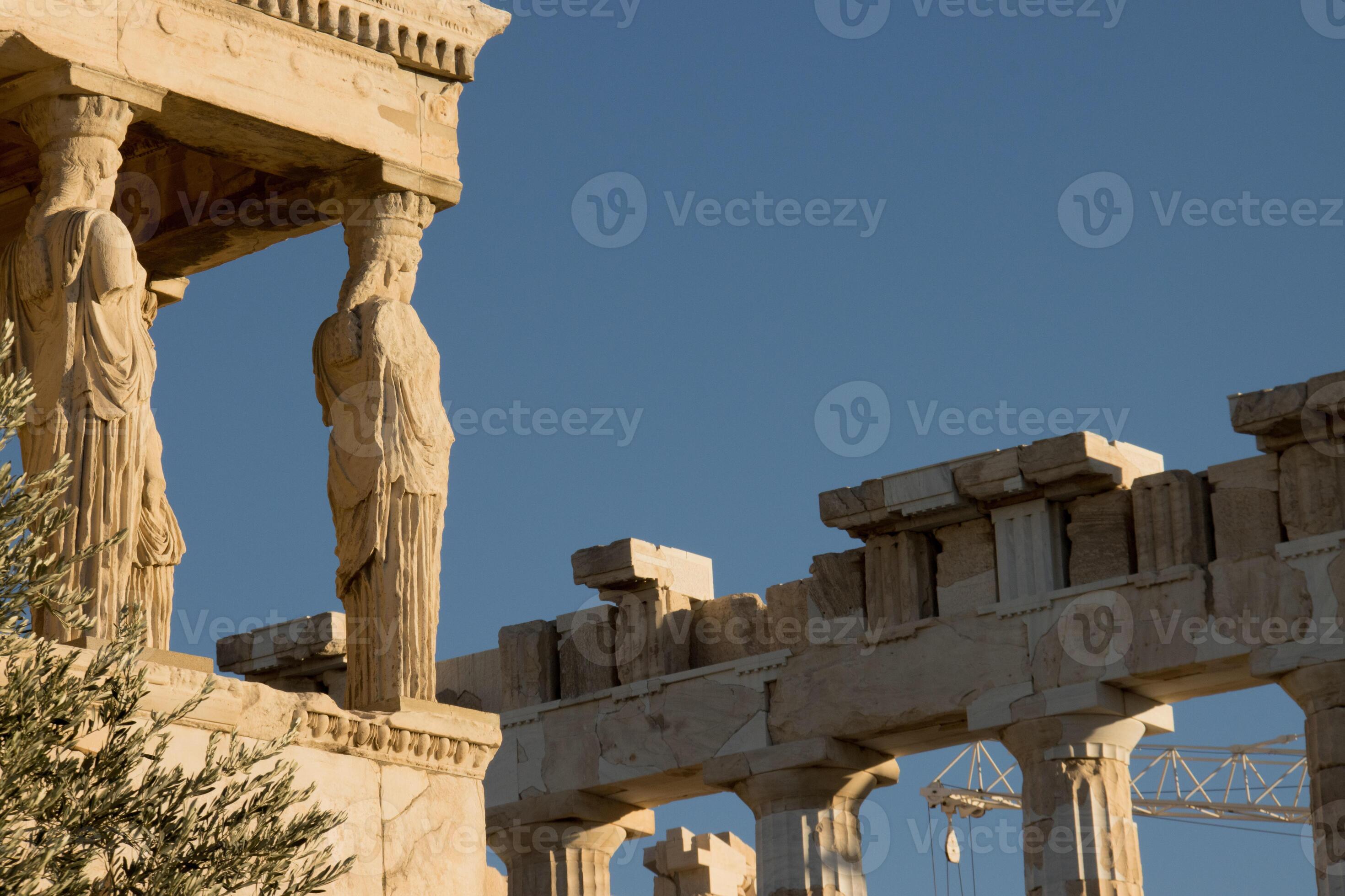 Porch of the Caryatids at The Erechtheion and Parthenon atop the ancient ruins of the Acropolis ...