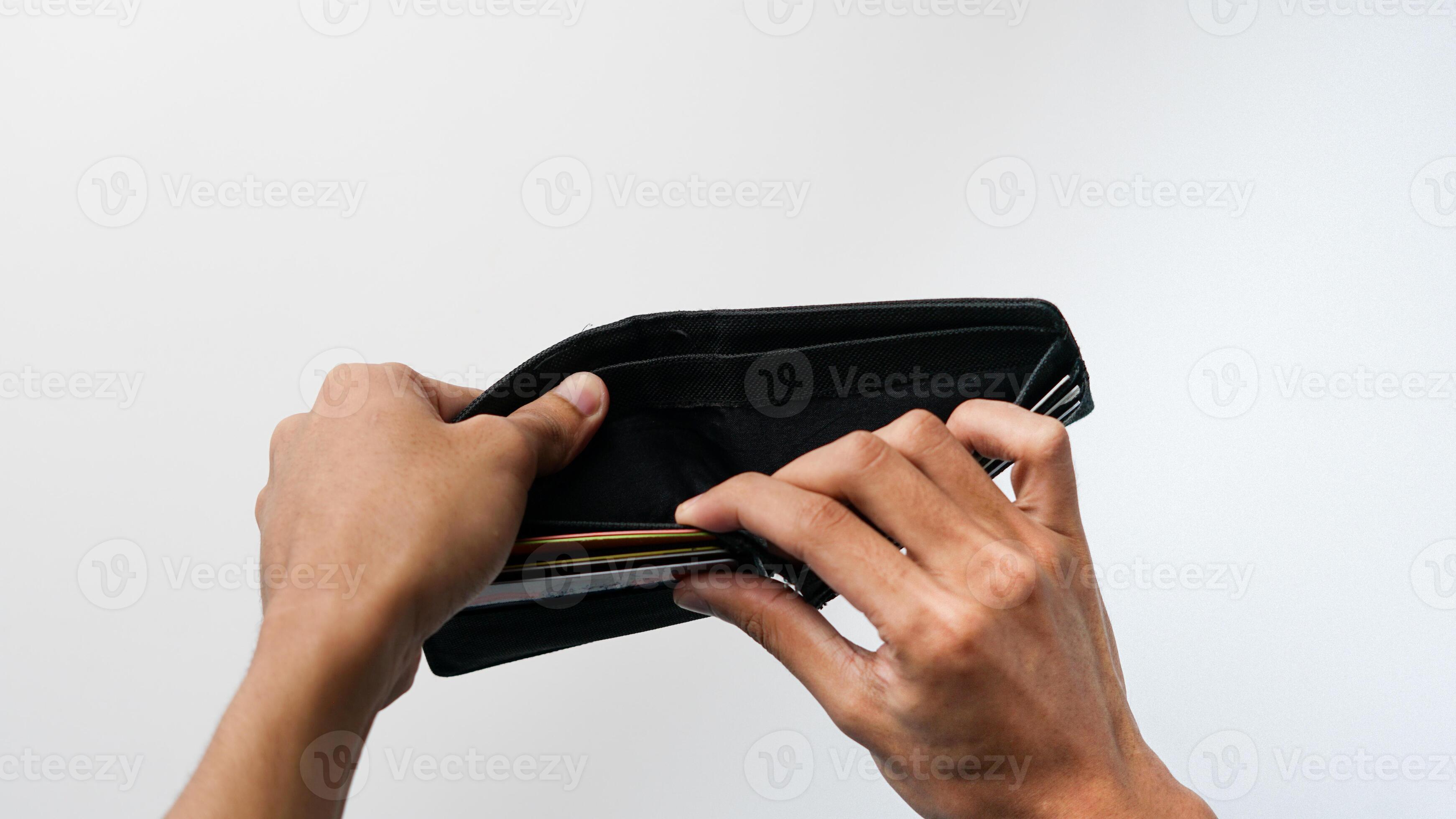 Hands of man holding empty wallet. end of month concept 37498122 Stock Photo at Vecteezy