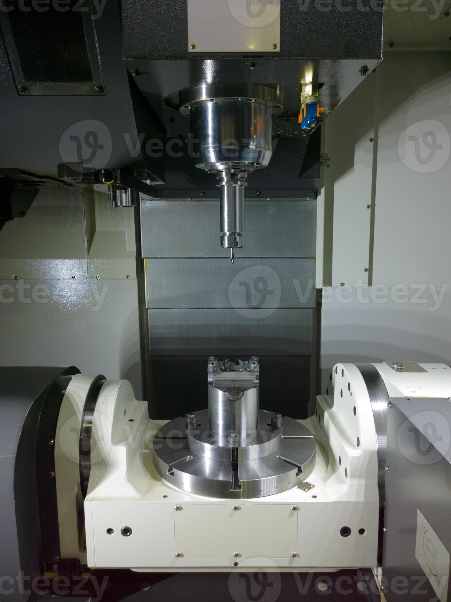 The five-axis Computer Numerical Control CNC machine waiting for stock change 37795822 Stock ...