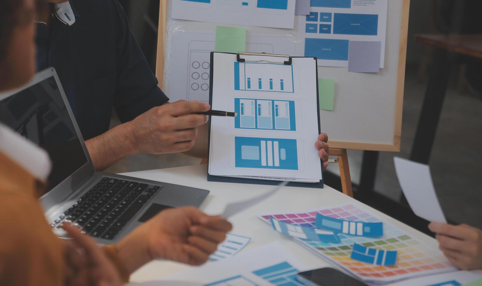 Close Up Ux Developer And Ui Designer Use Augmented Reality Brainstorming About Mobile App