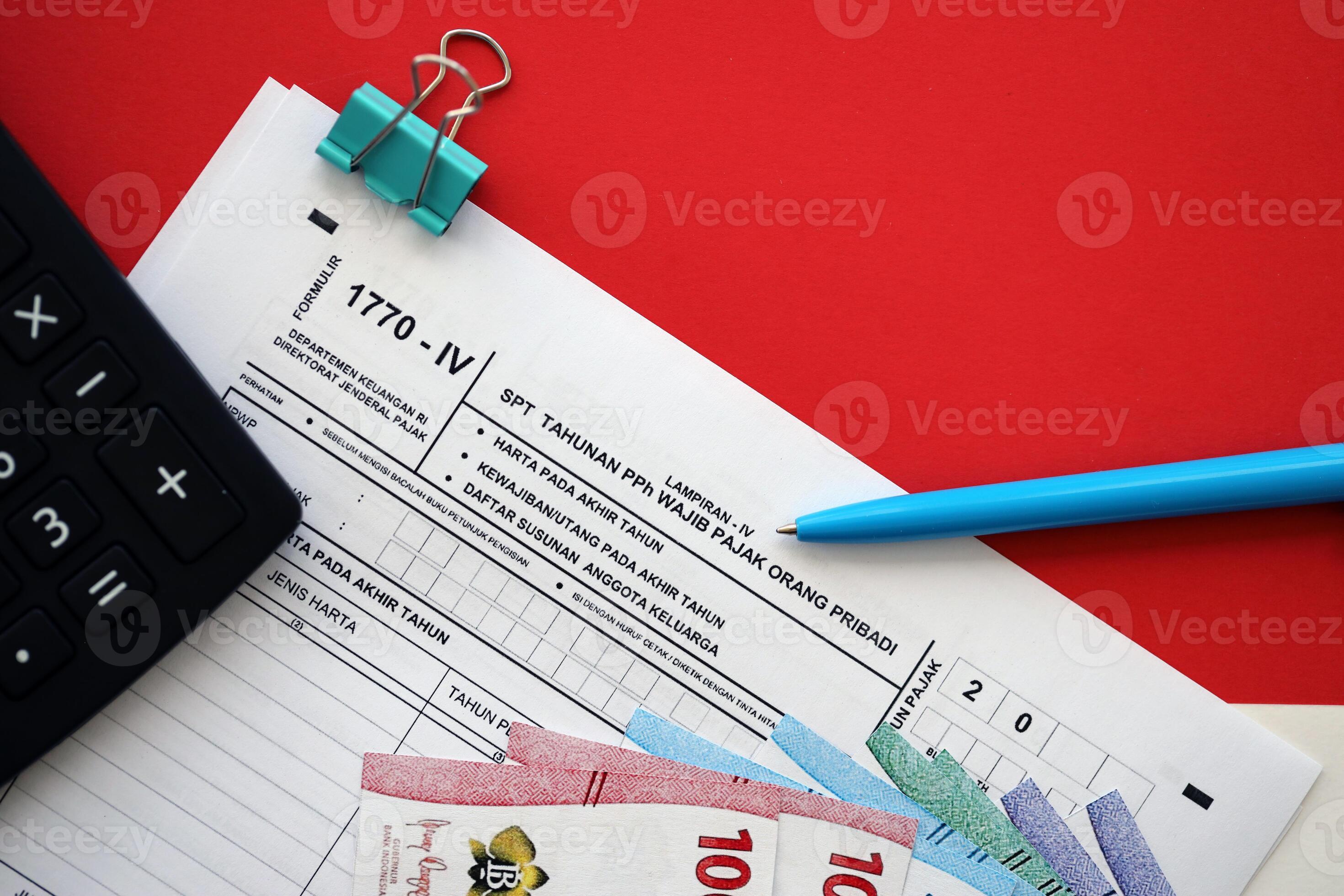 Indonesian tax form 1770-4 Individual Income Tax Return and pen on table 37922796 Stock Photo at ...