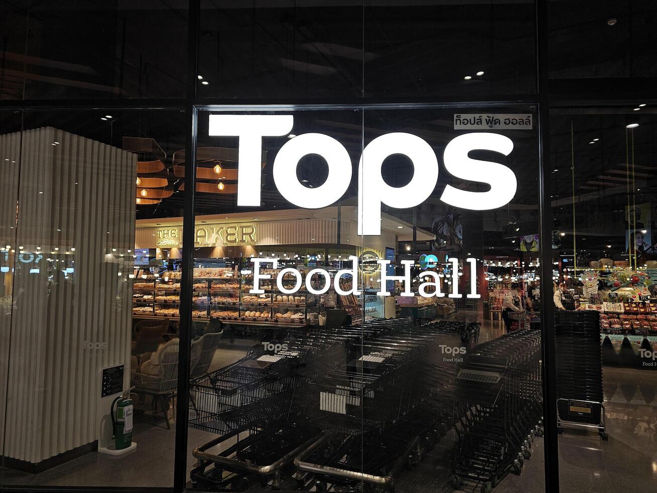 BANGKOK, THAILAND JANUARY 18, 2024 Tops Food Hall Sign. It is a famous supermarket in Bangkok ...