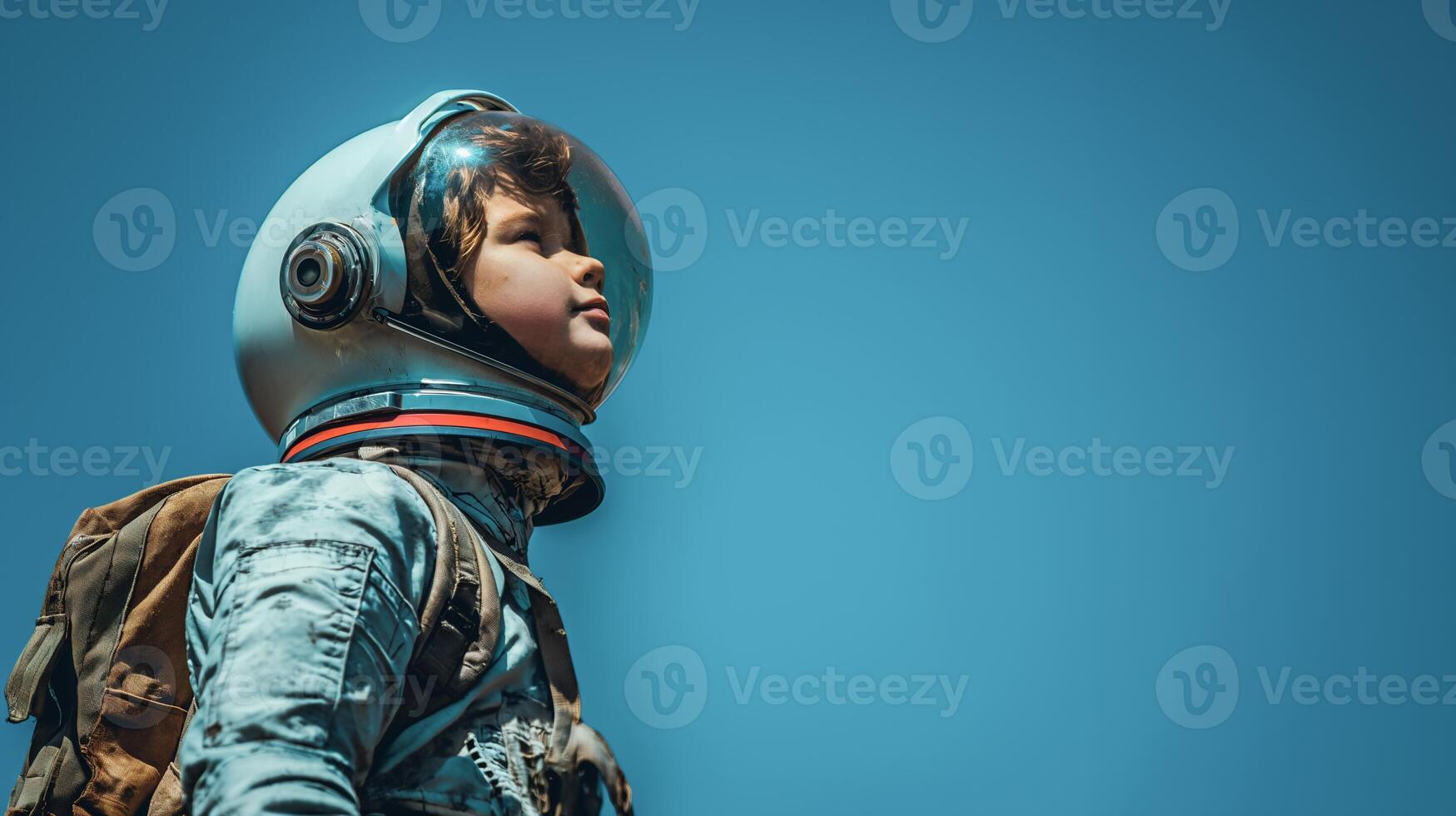 AI generated Young boy in a spacesuit wearing helmet like the cosmonaut ... AI generated Young boy in a spacesuit wearing helmet like the cosmonaut ...