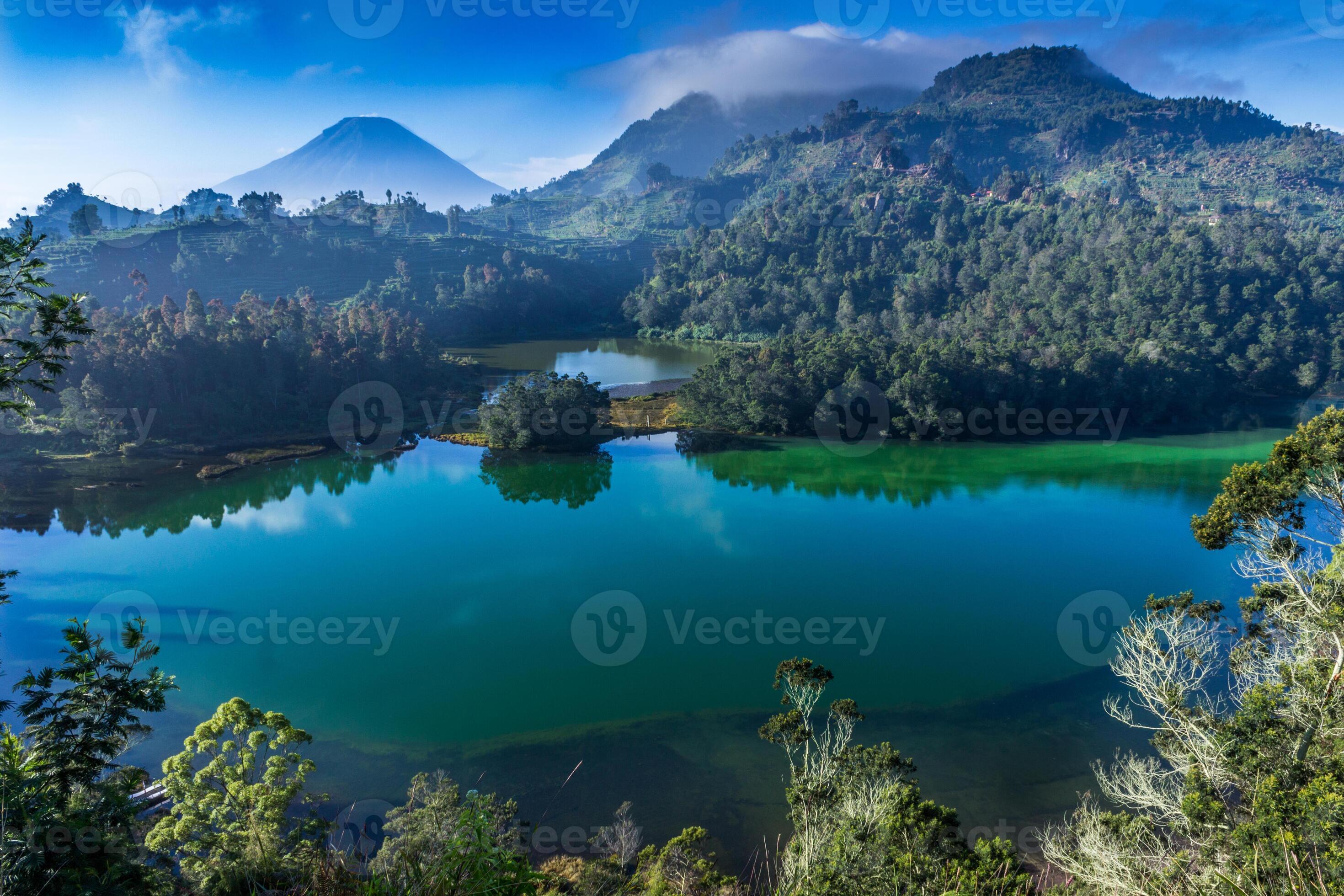 Beautiful view of colorful lake or Telaga Warna in Dieng Plateau ...