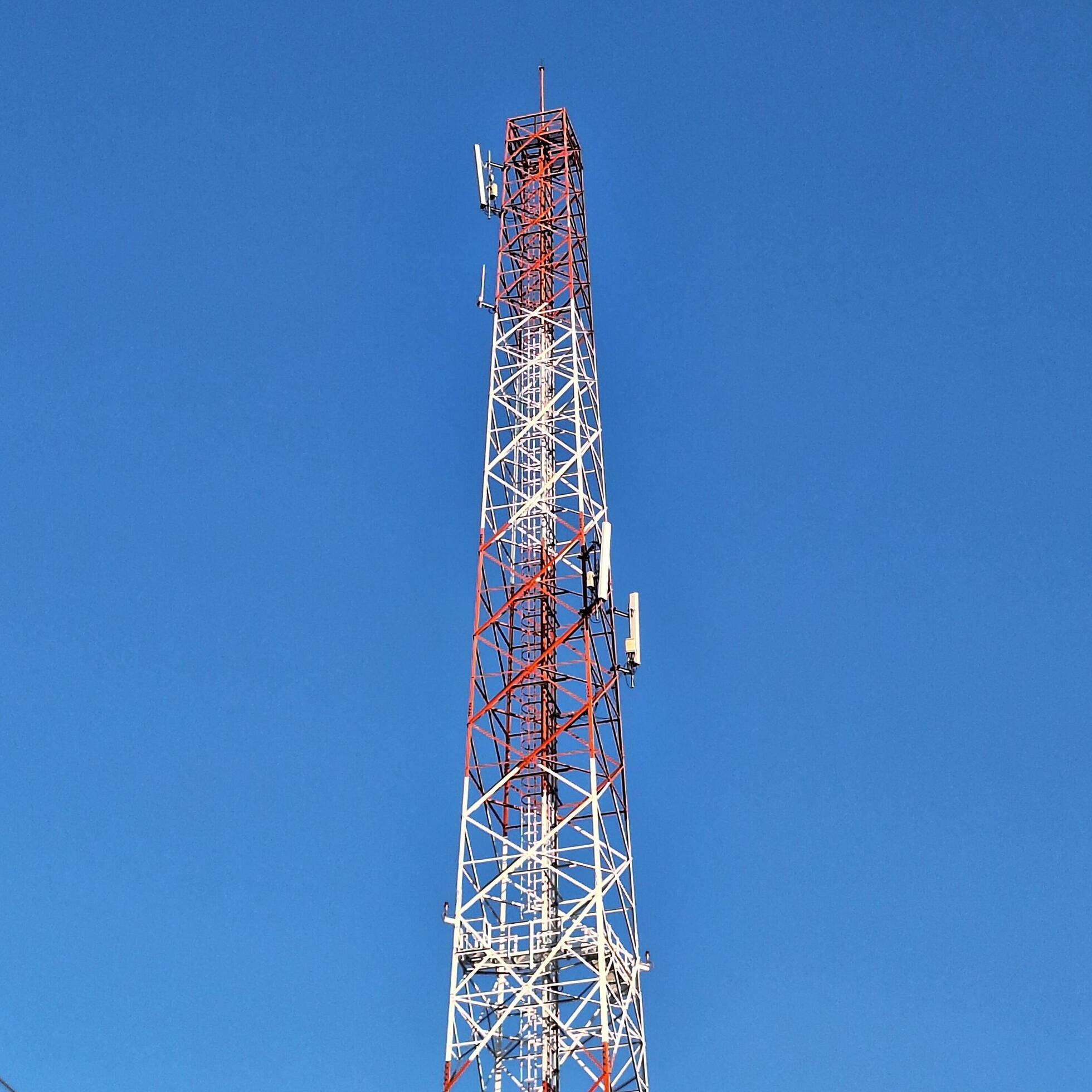 Tall towers for transmitting and distributing telephone and internet signals. 38514932 Stock ...
